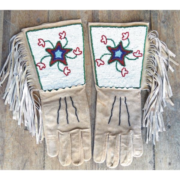 large pair of newer Indian made beaded gauntlets