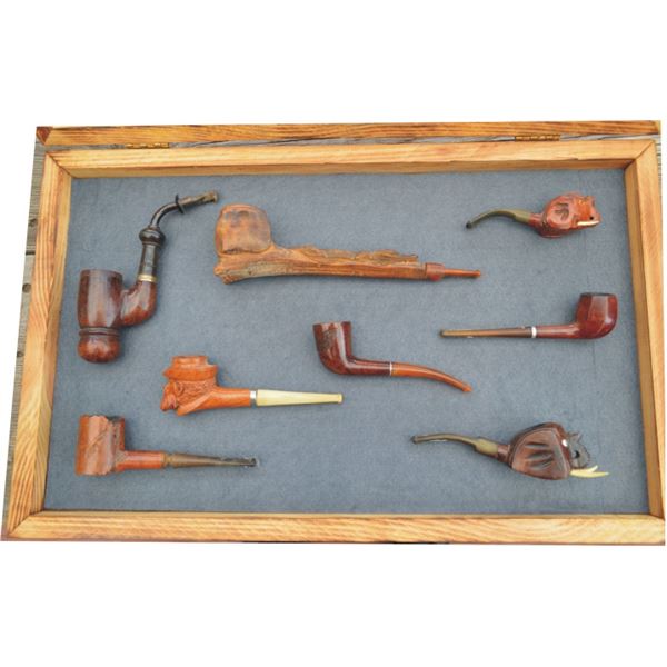 frame of 7 antique tobacco pipes
