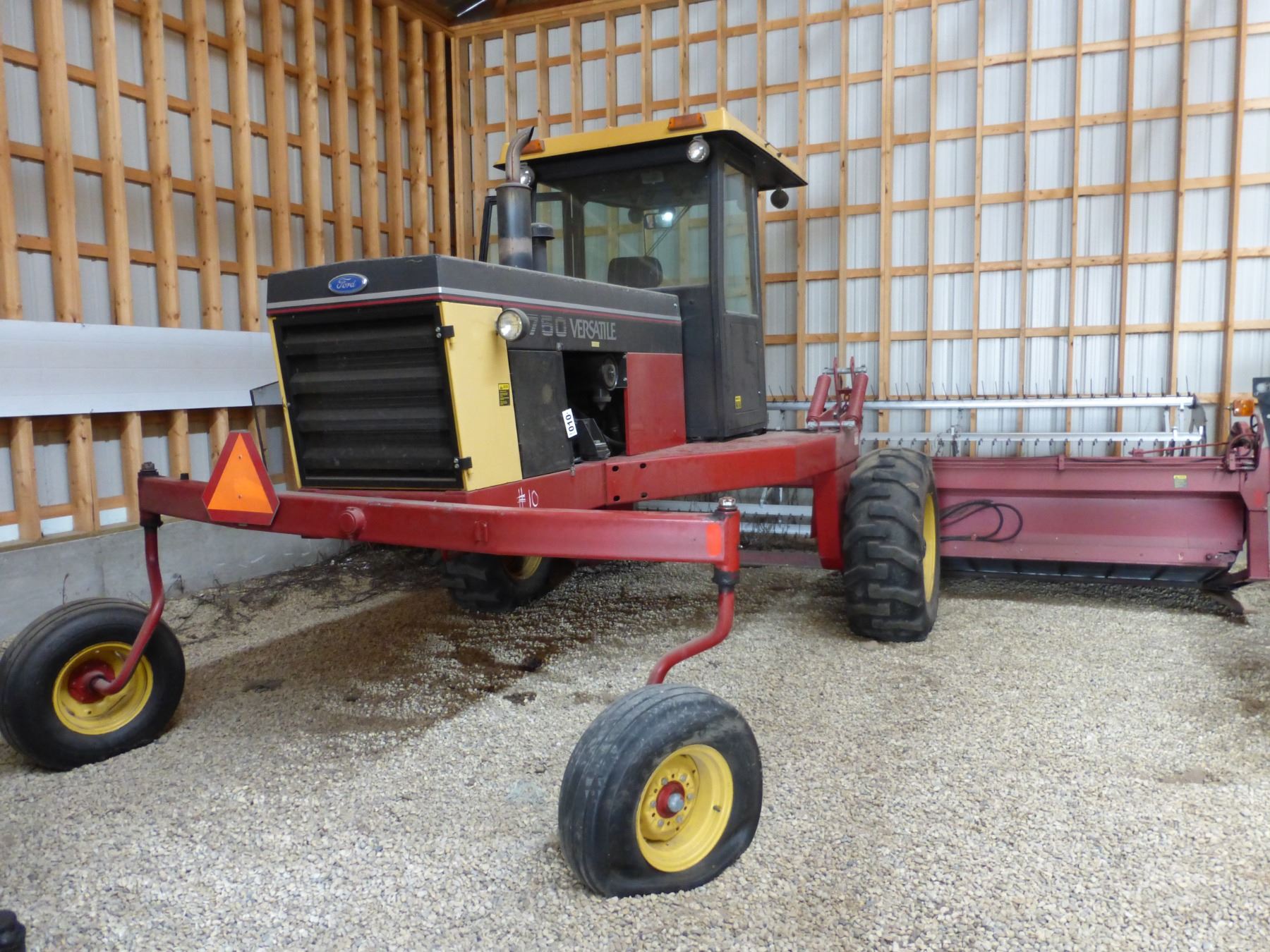 Versatile 4750 swather #D46030 c/w 4022 header, 1445 hrs, CAHR, shedded ...