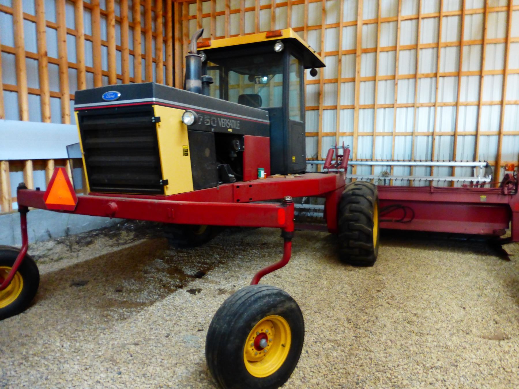 Versatile 4750 swather #D46030 c/w 4022 header, 1445 hrs, CAHR, shedded ...