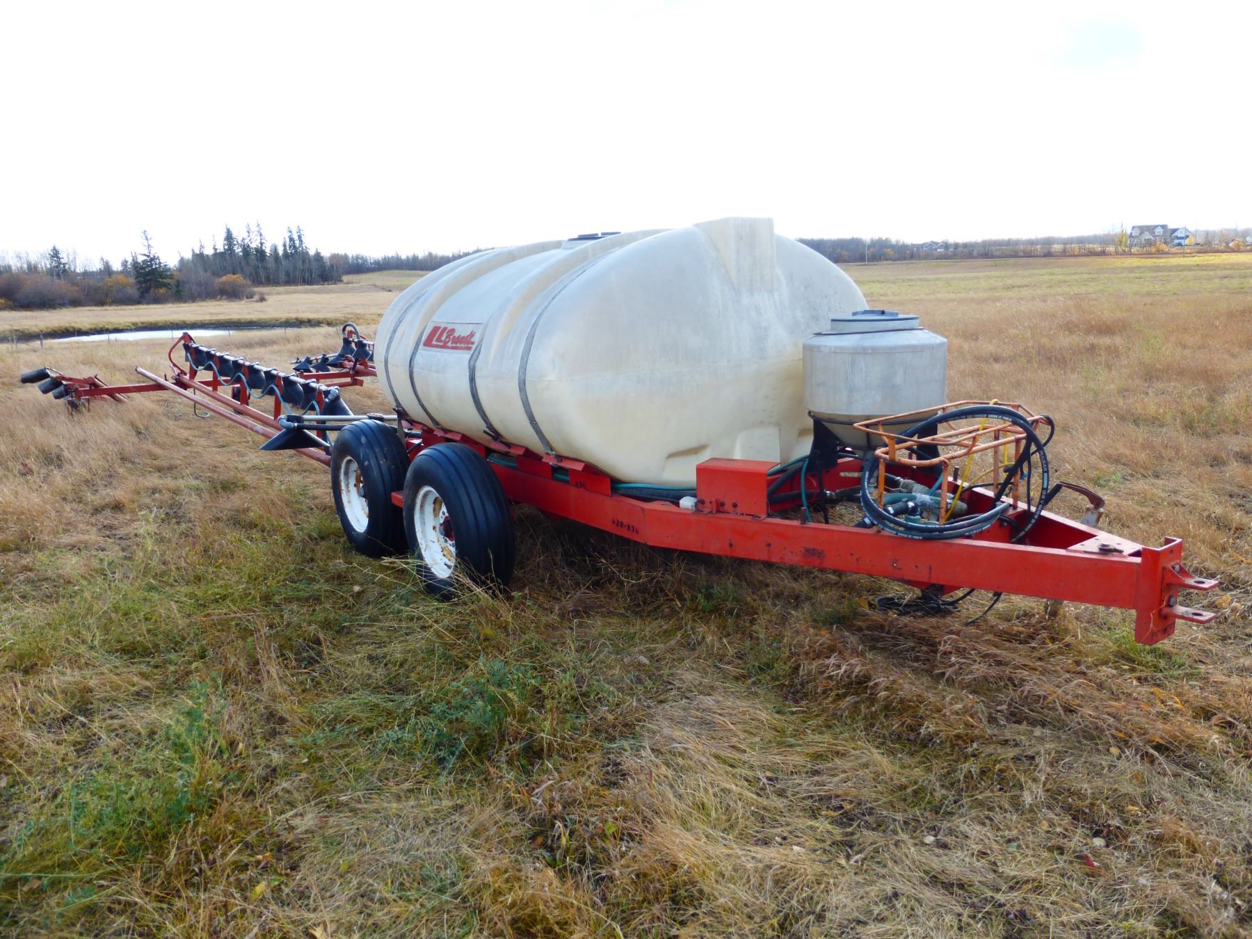 BRANDT 60' Sprayer, Poly tank, wind screens, booms at rear need repair
