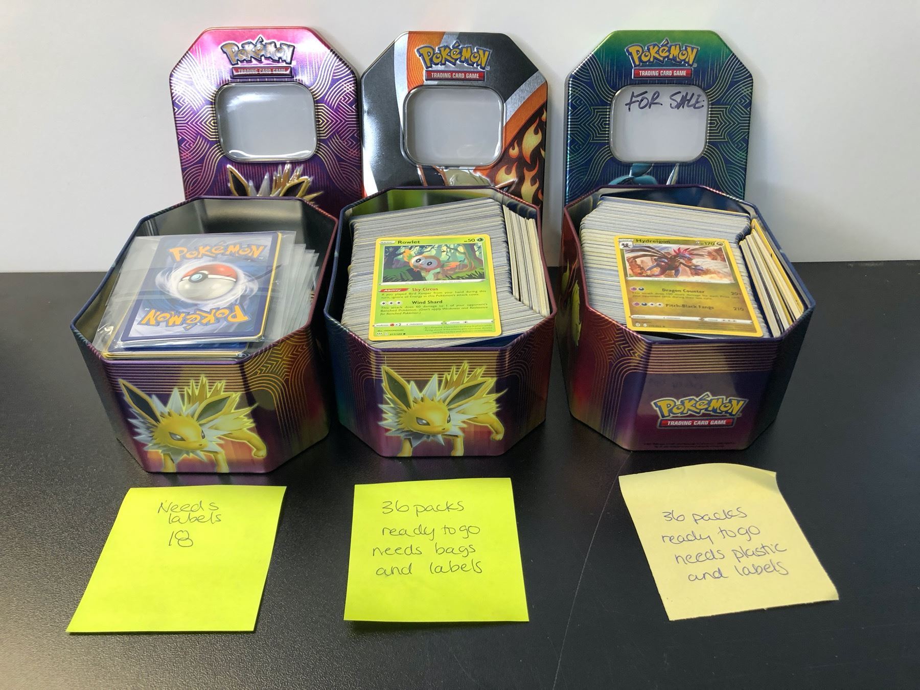 Group of 3 Pokémon tins full of collectible cards sets - approx. 720 ...