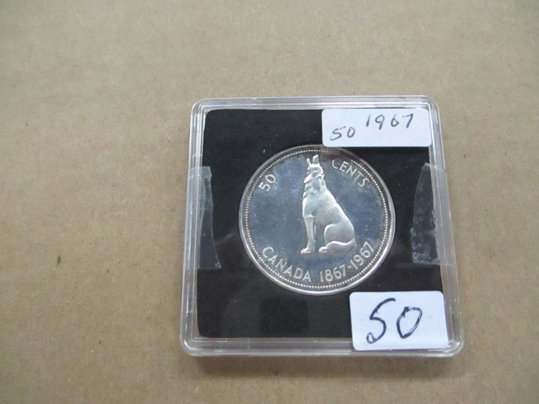 1967 WOLF SILVER FIFTY CENT COIN