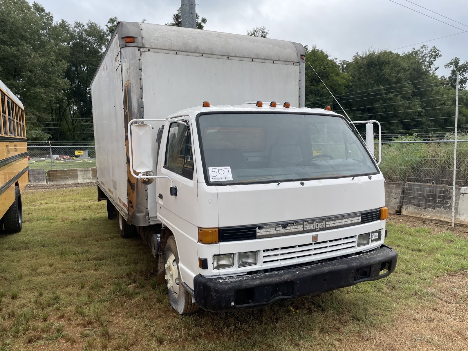 1993 ISUZU NPR Box Truck - J.M. Wood Auction Company, Inc.