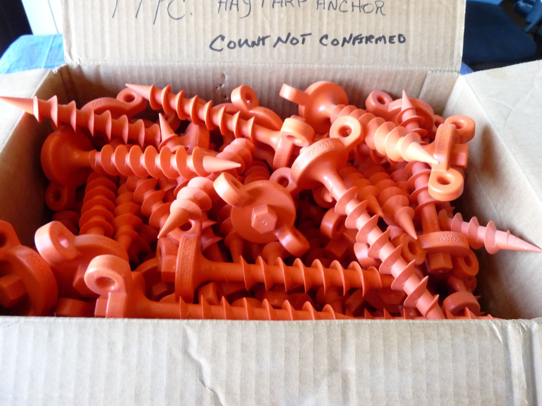 Box of 5 inch hay tarp anchors -- count not confirmed