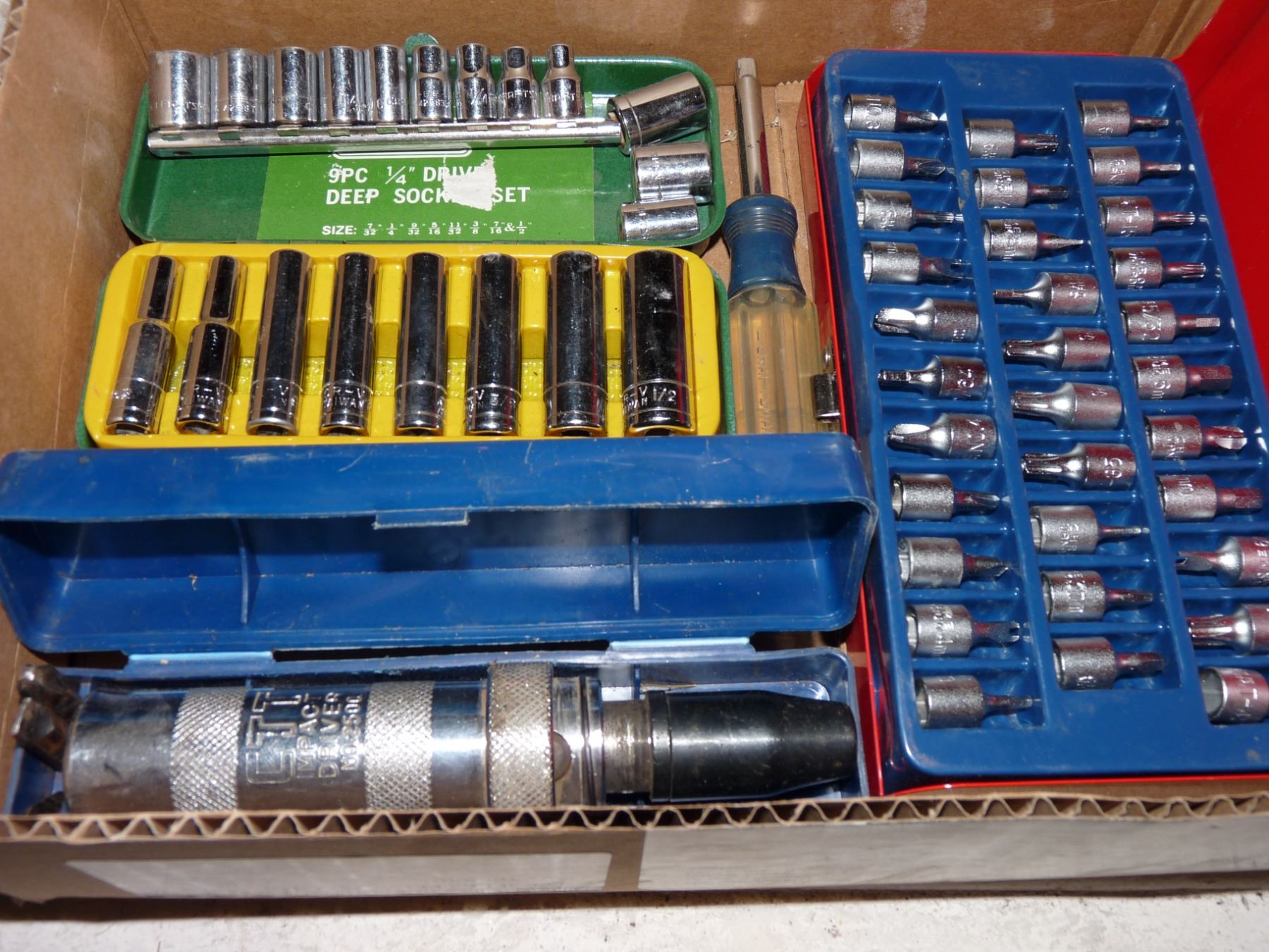 Box of quarter inch drive sockets etc and impact driver