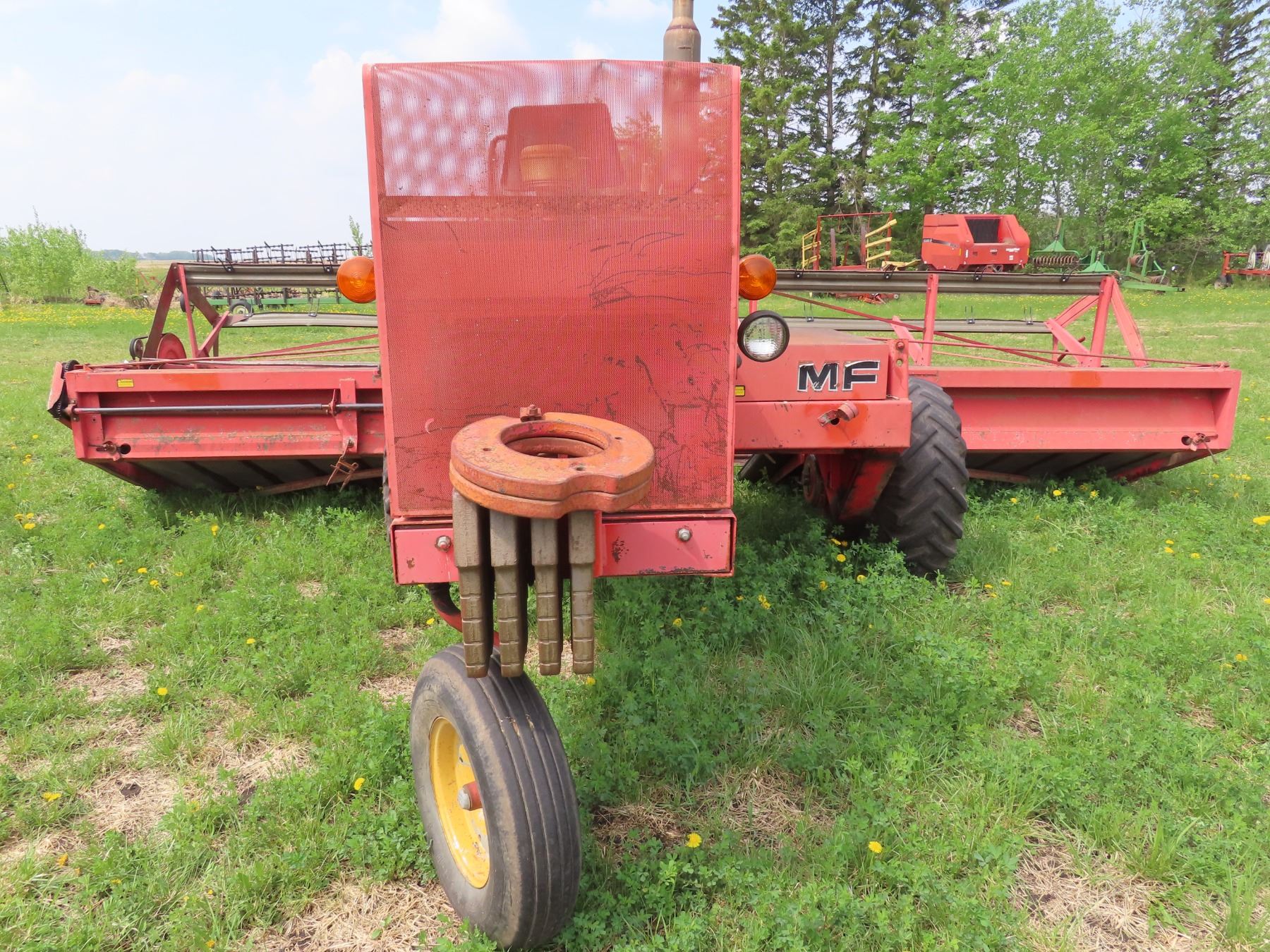 Massey Ferguson SP 775 swather with transport - running, working ...