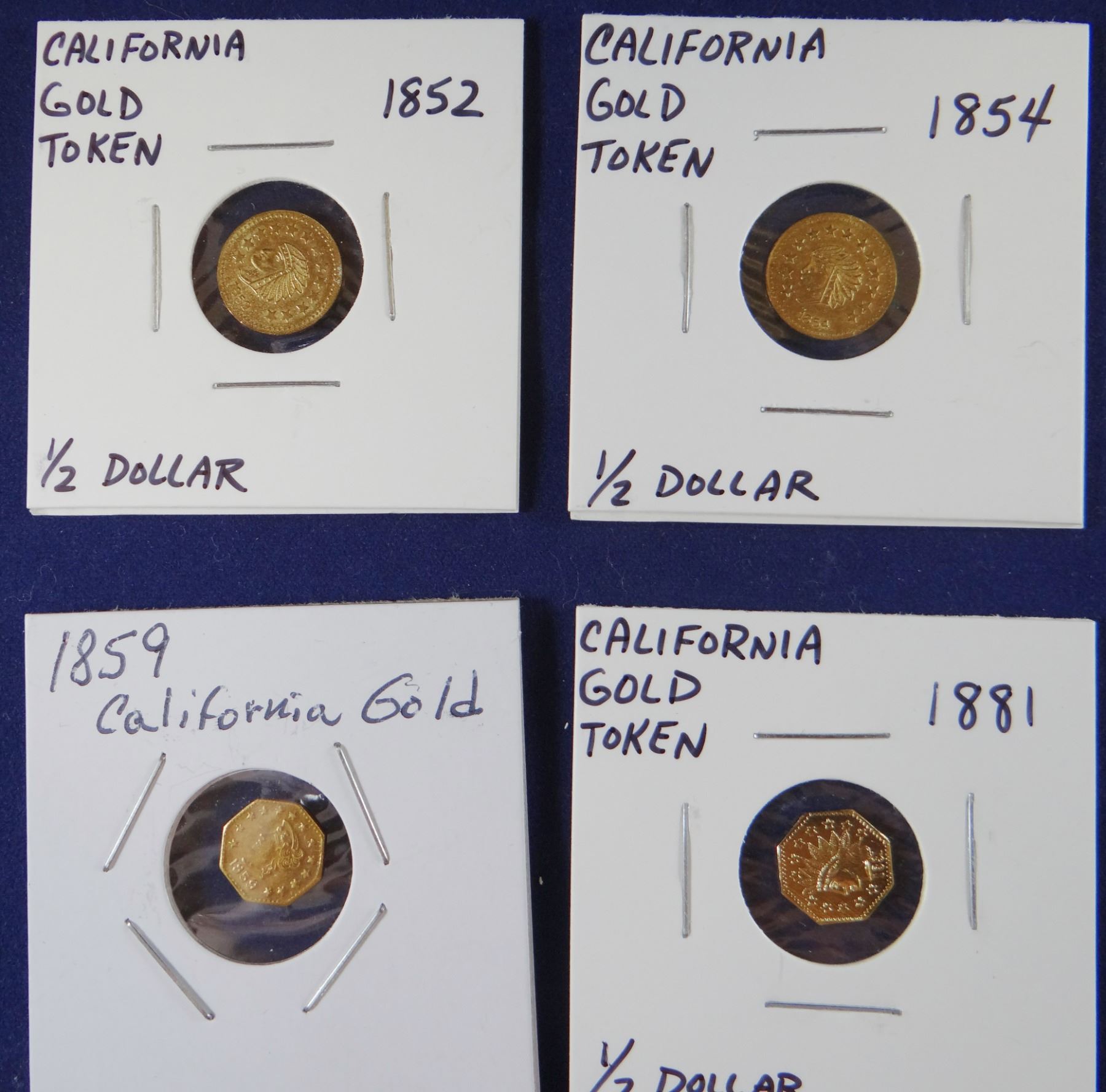 (4) California ½ dollar gold tokens: 1852, 1854, 1861, 1852
