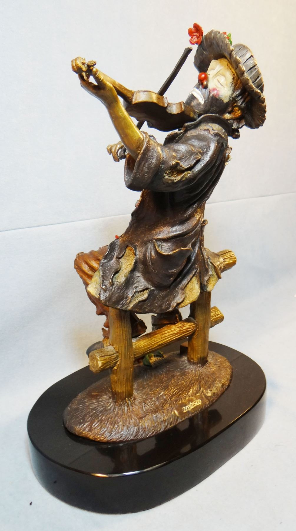 Emmett Kelly Jr./Peter Apsit, polychrome sculpture, The Maestro, 10" x 15" x 7", #203/25