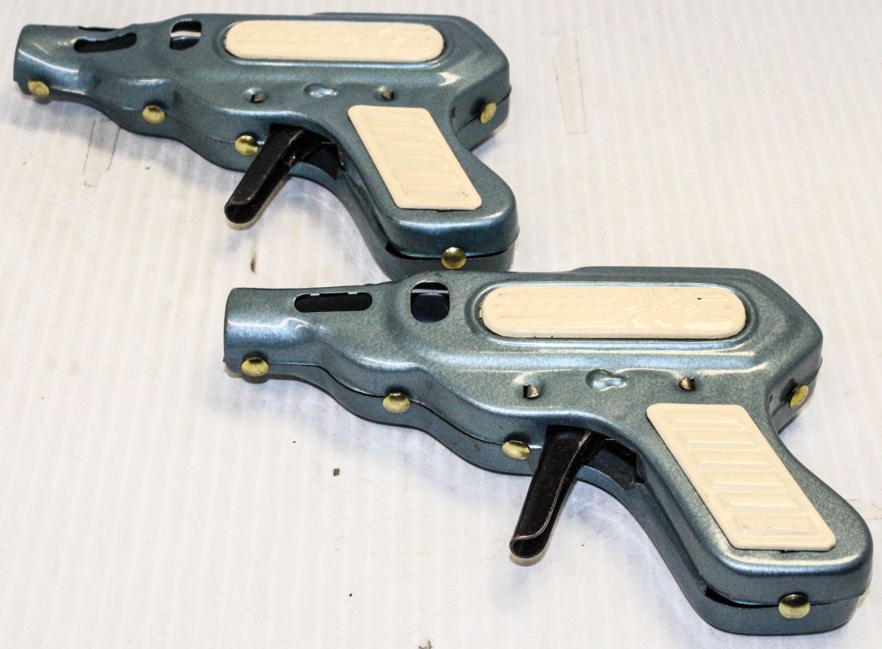 PAIR 1950S TIN SPACE GUNS