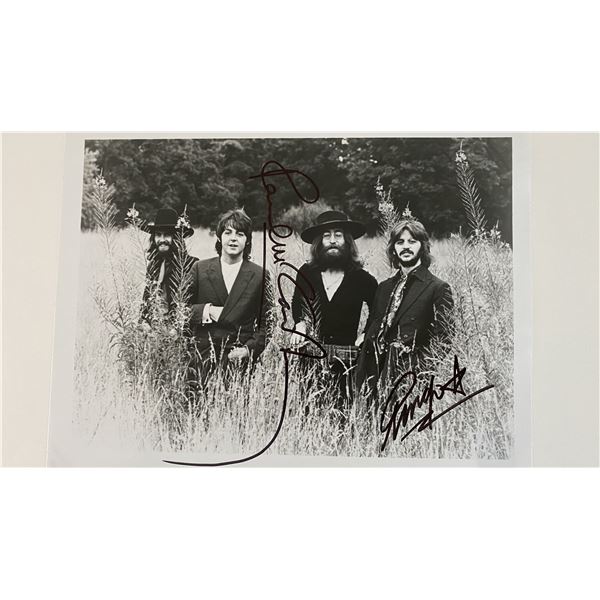 The Beatles rare band photo. GFA Authenticated