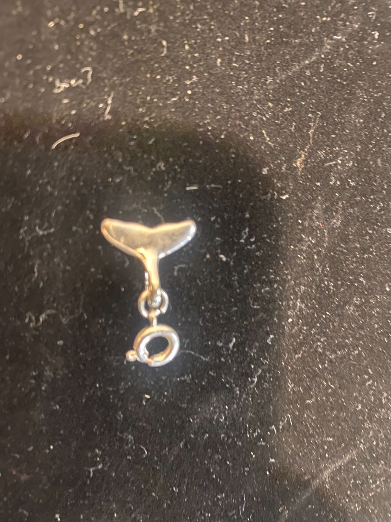 Whale tale pendant