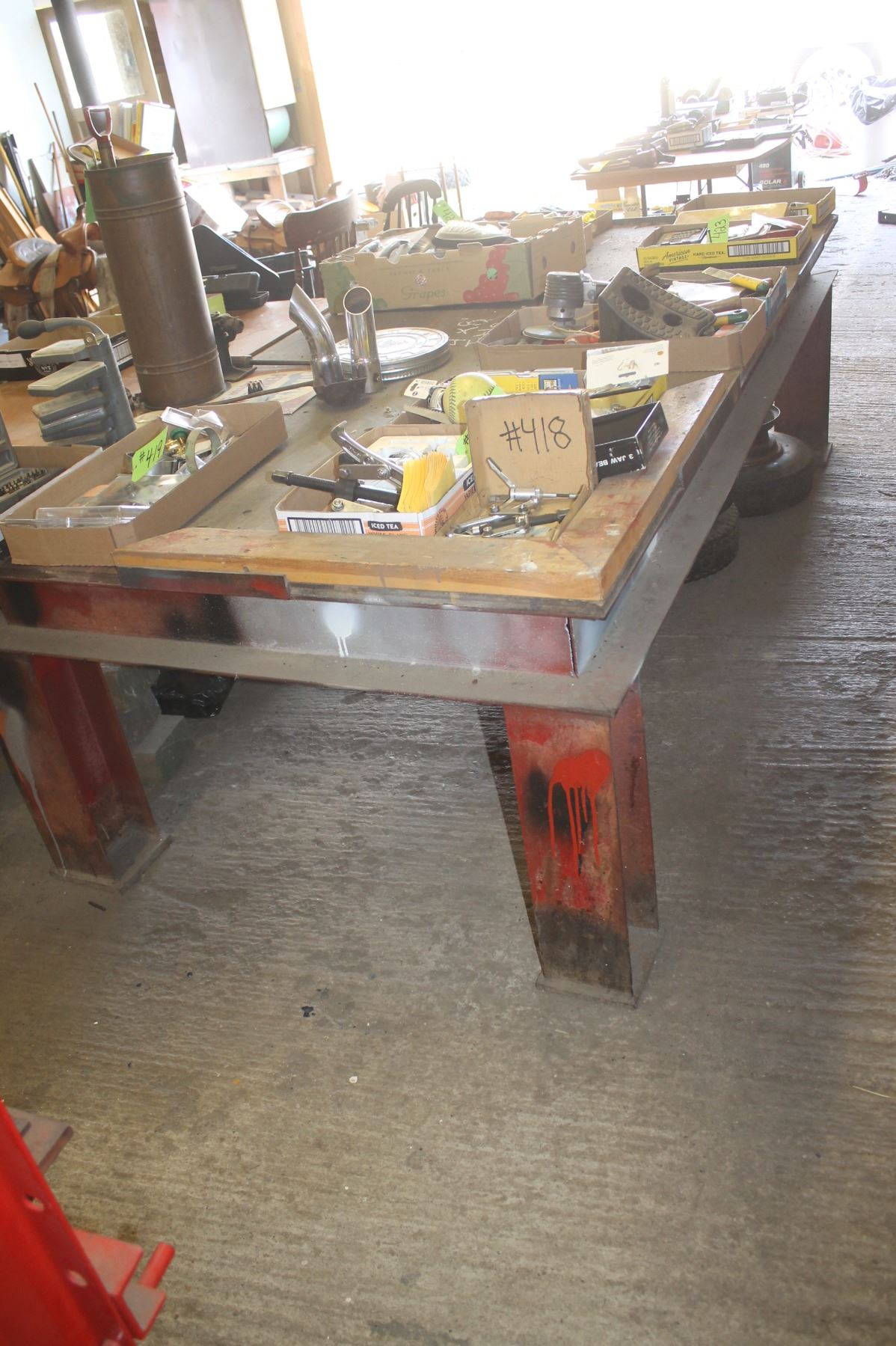4 x 8 Heavy steel frame table c/w wood counter top (Can not be removed ...