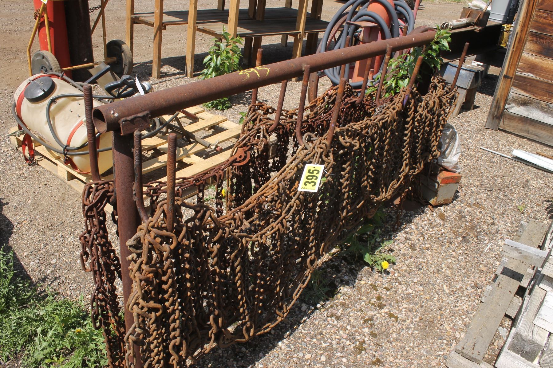 Tire chain rack (large) with 3 sets of chains, plus cross chains.