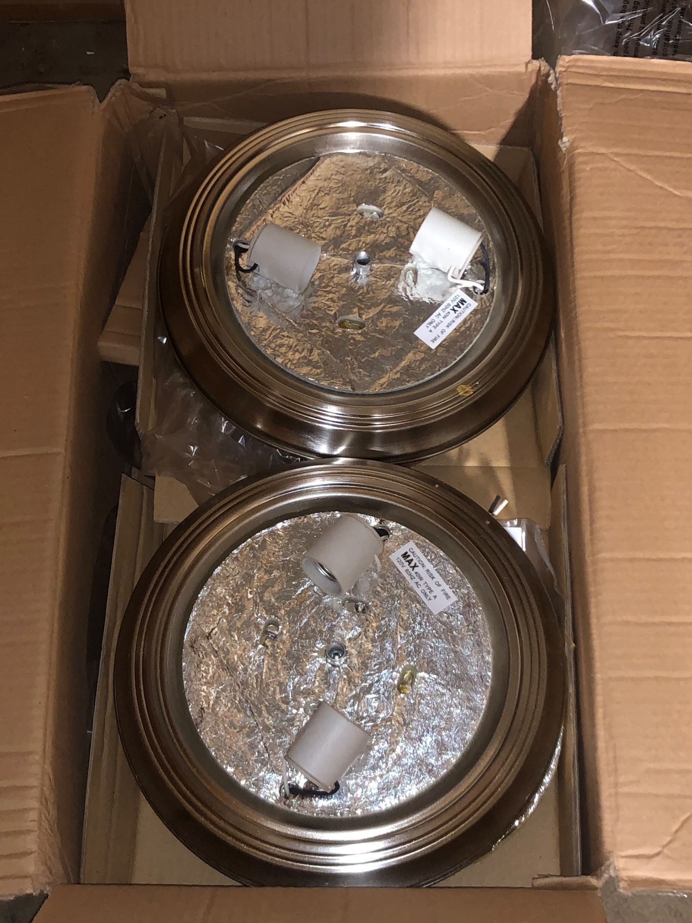 Box full of new light fixtures