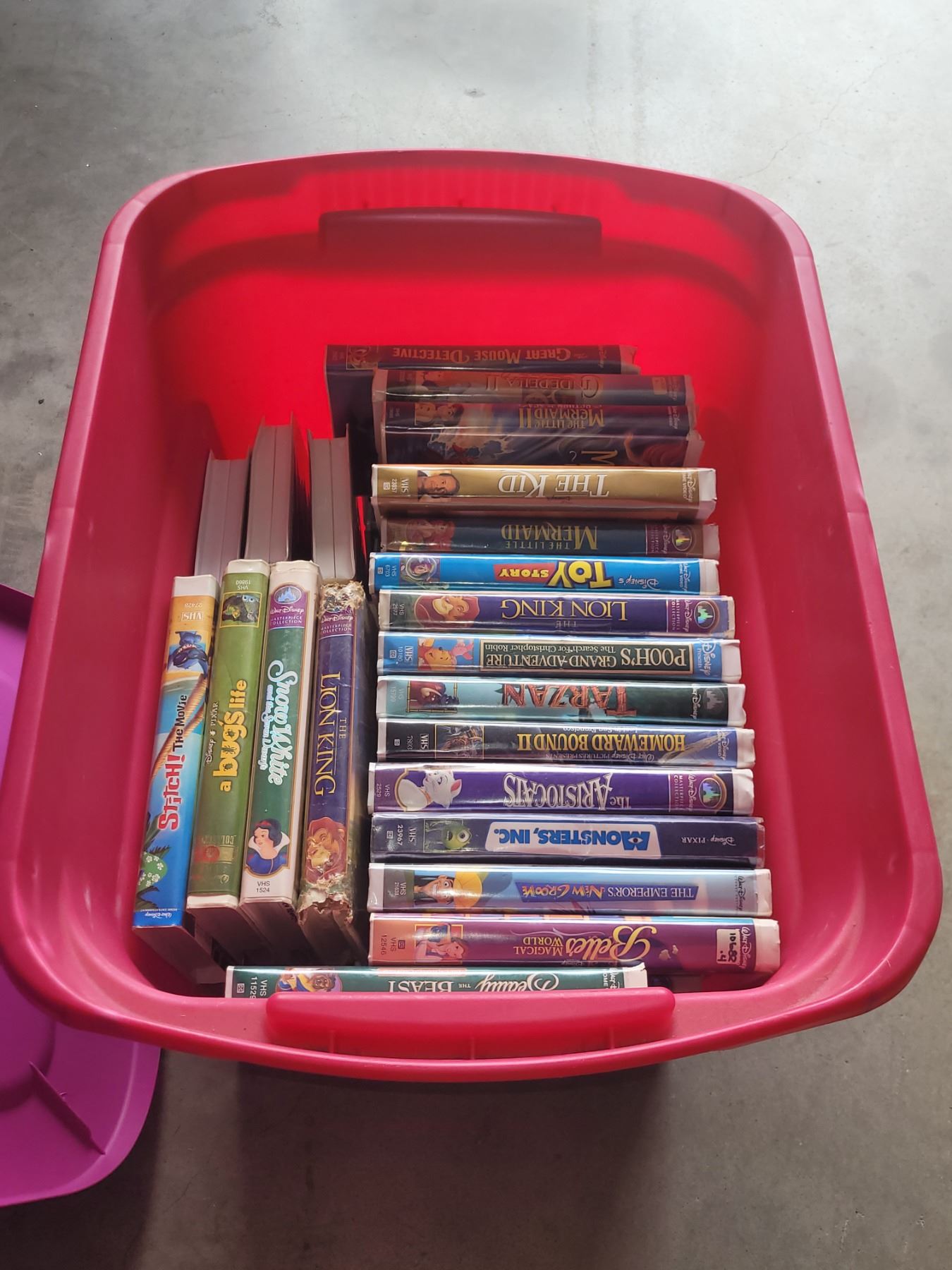 PINK TOTE OF DISNEYS VHS TAPES
