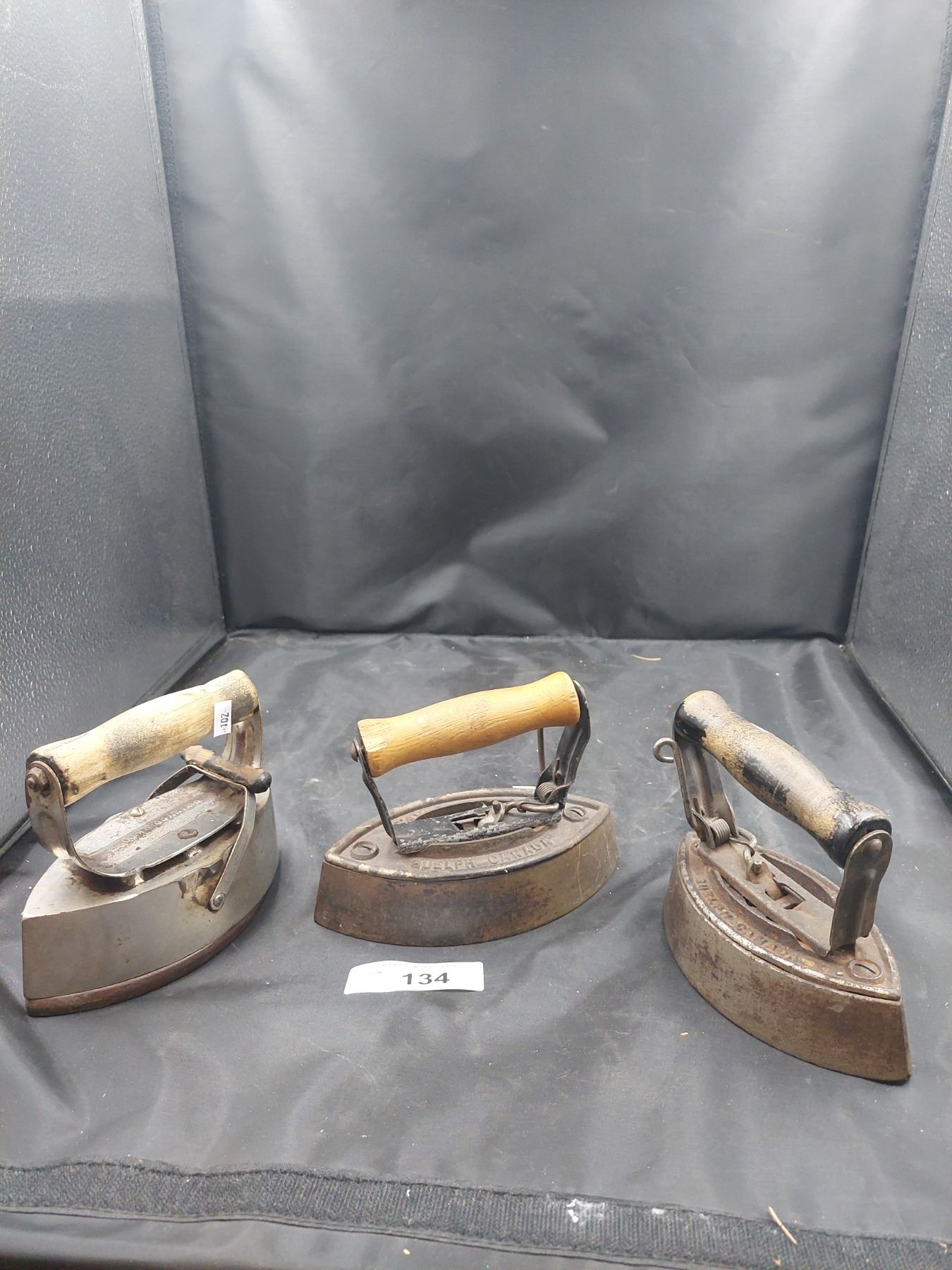 THREE ANTIQUE SAD IRONS
