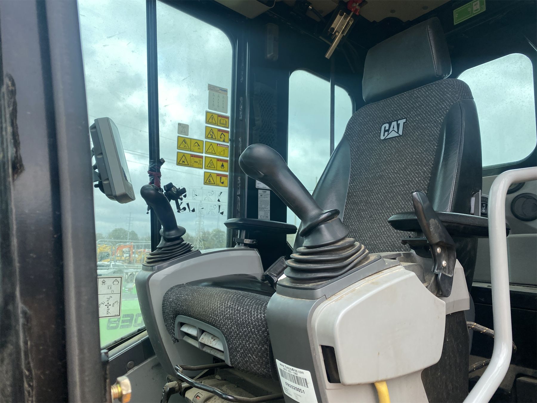 2021 CAT 538LL TRACK Log Loader - J.M. Wood Auction Company, Inc.