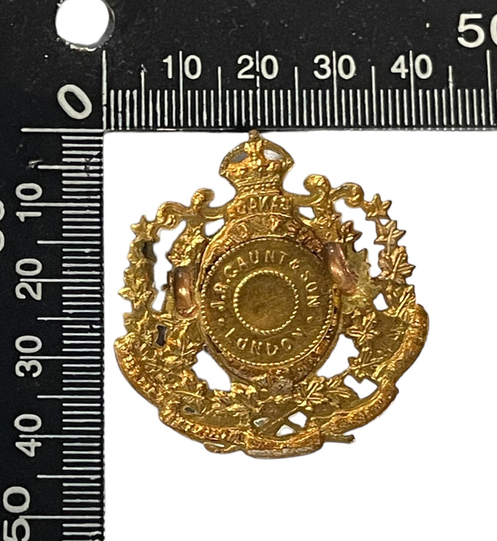 NWMP North West Mounted Police Cap Badge