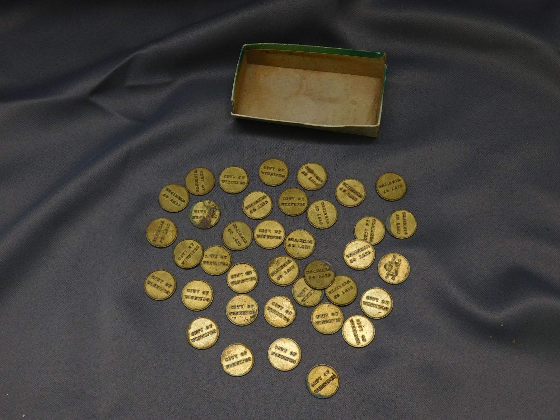 Small Box of City of Winnipeg Tokens / Coins Transit?