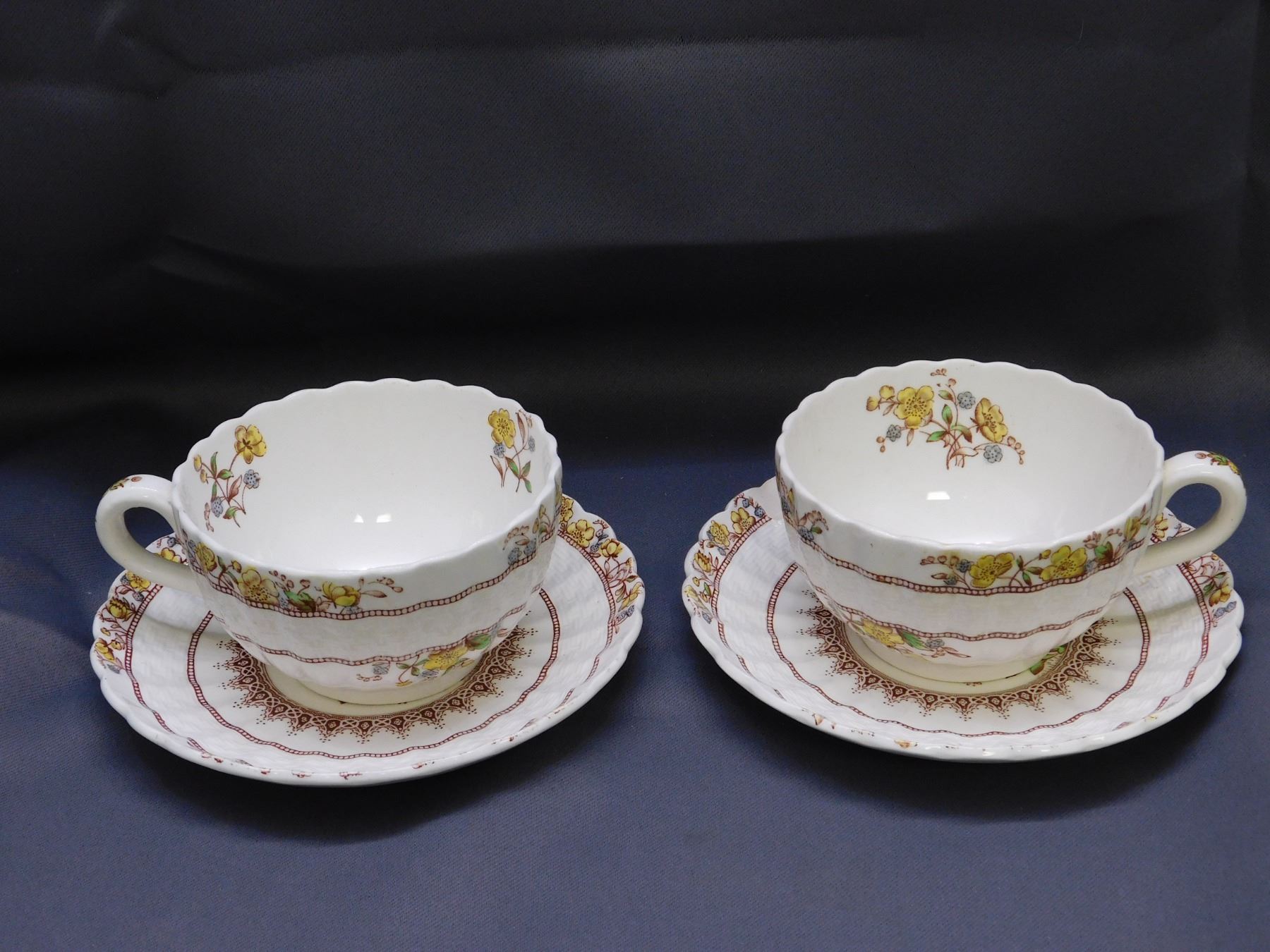 Pair Copeland Spode "Buttercup" Tea Cups And Saucers