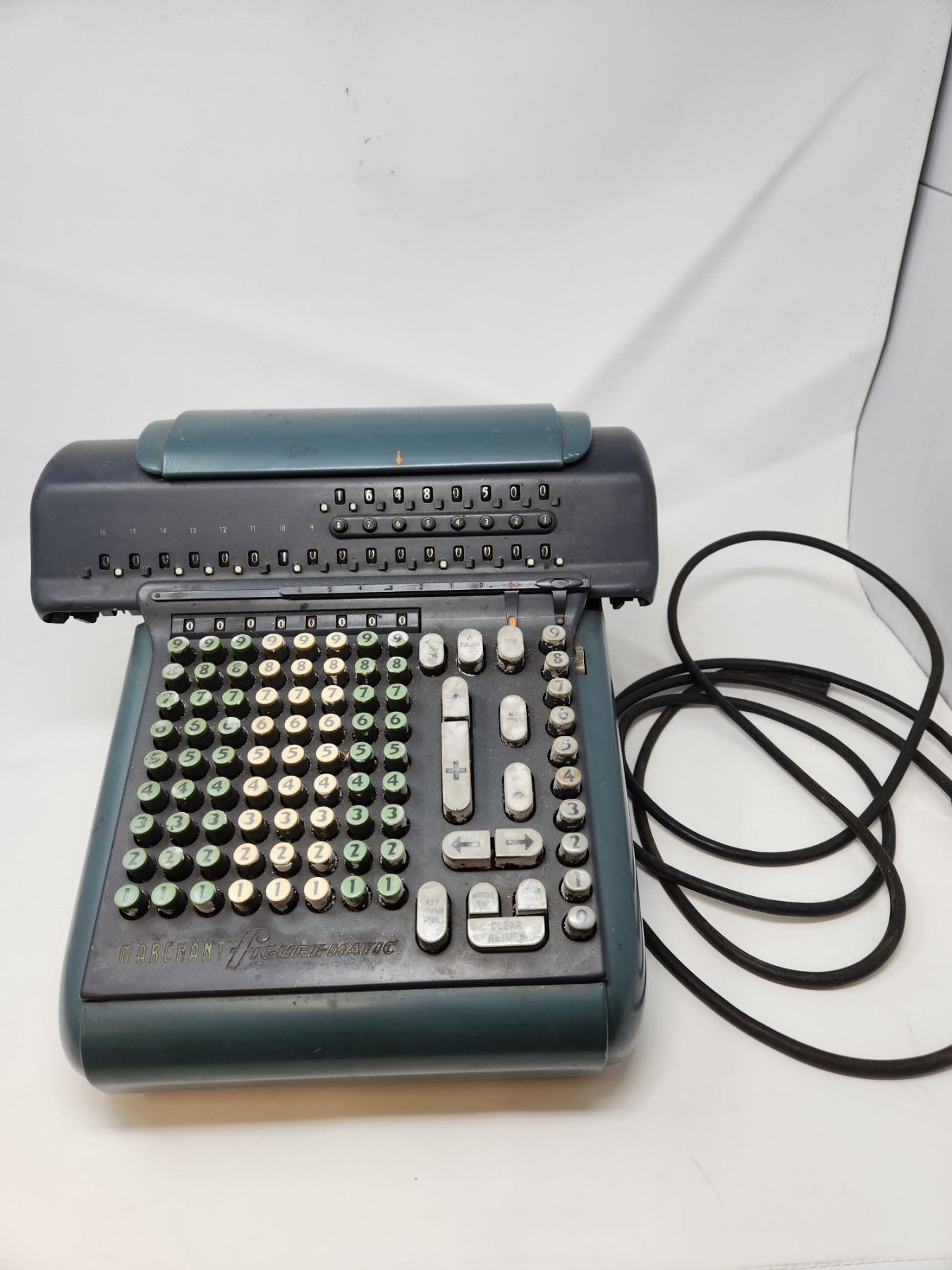 Antique adding machine