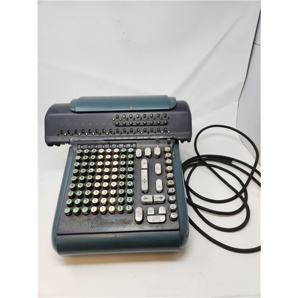 Antique adding machine