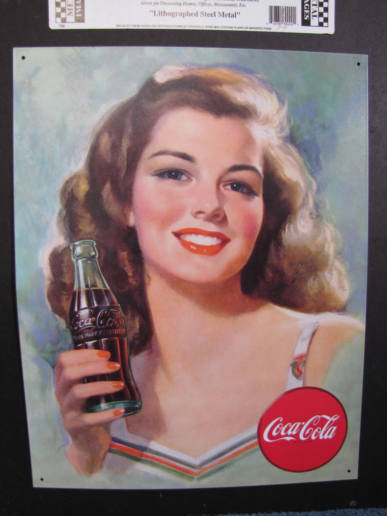 Reproduction vintage metal Coca-Cola sign
