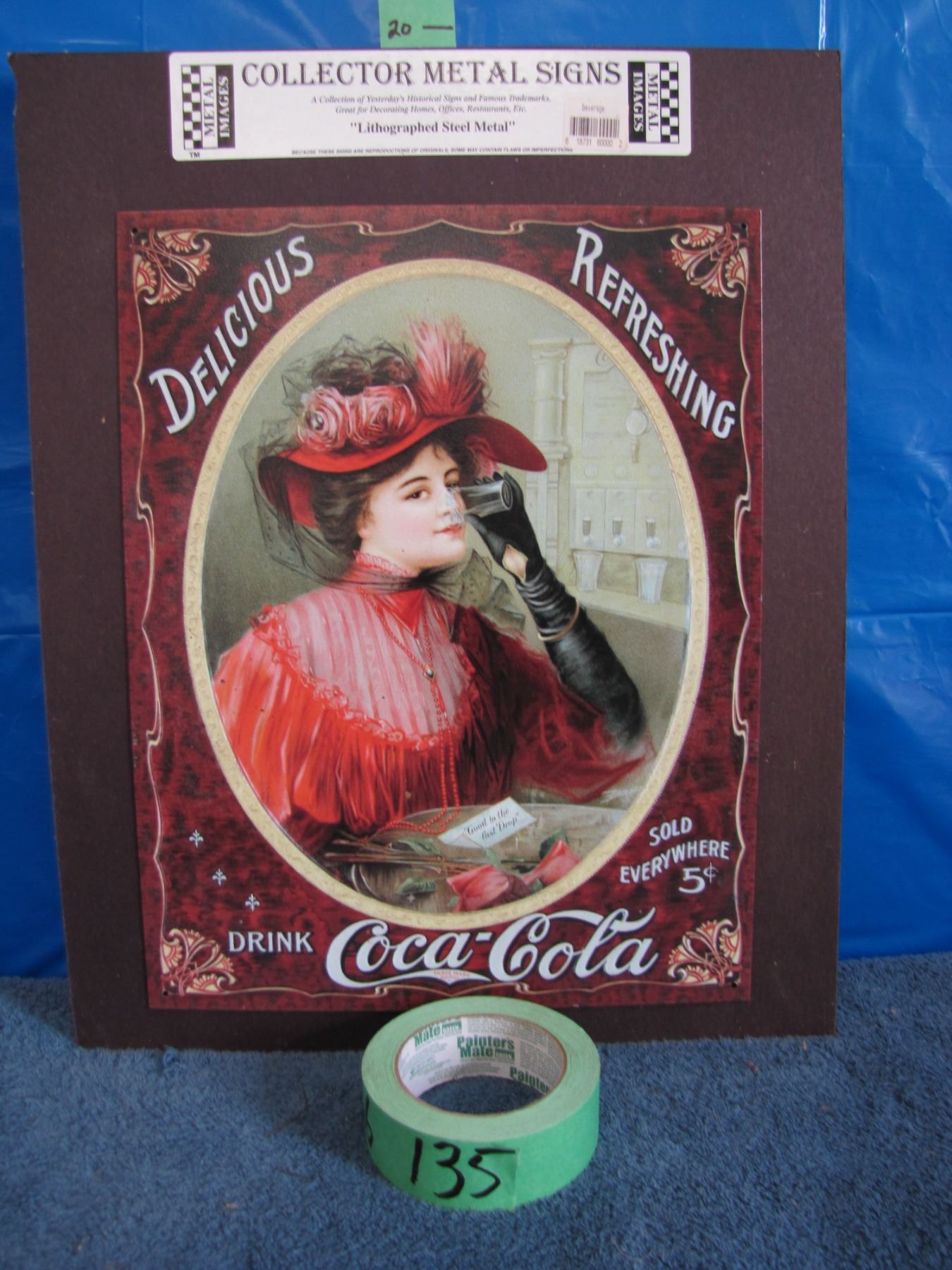 Reproduction vintage metal Coca-Cola sign