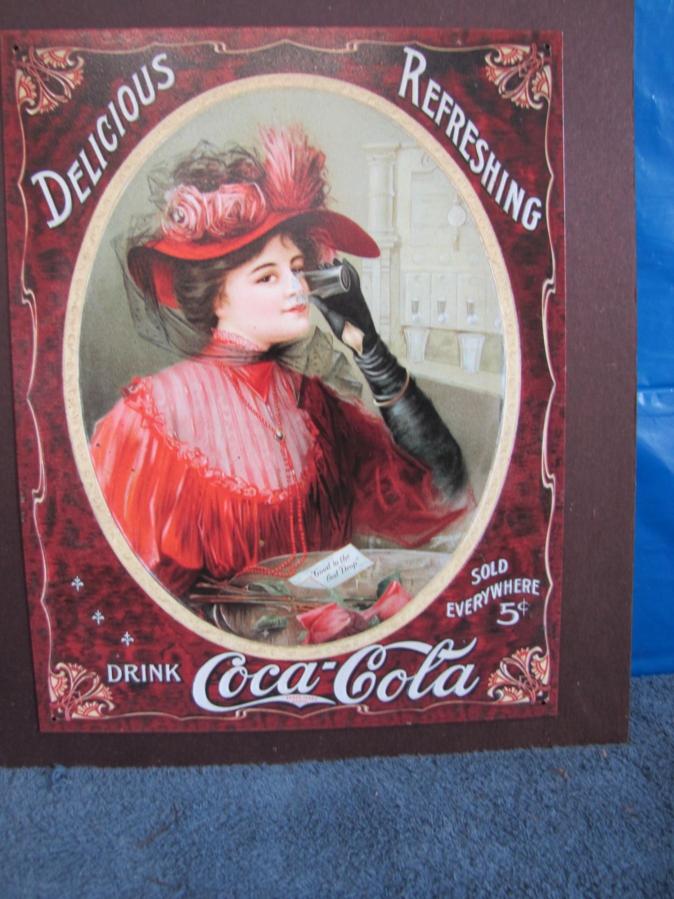 Reproduction vintage metal Coca-Cola sign