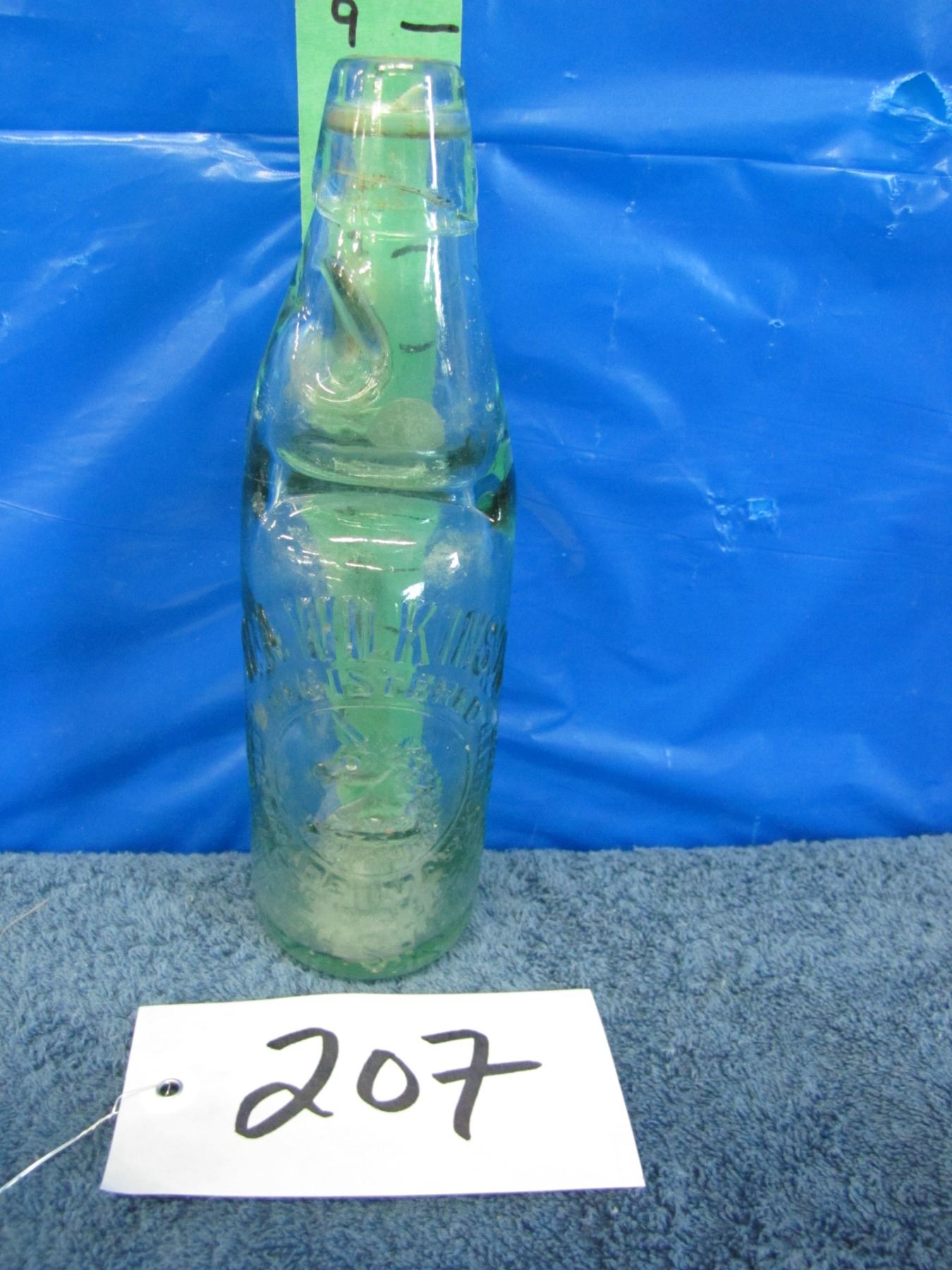 Codd bottle embossed w. A. Wilkinson registered trademark soda water ...