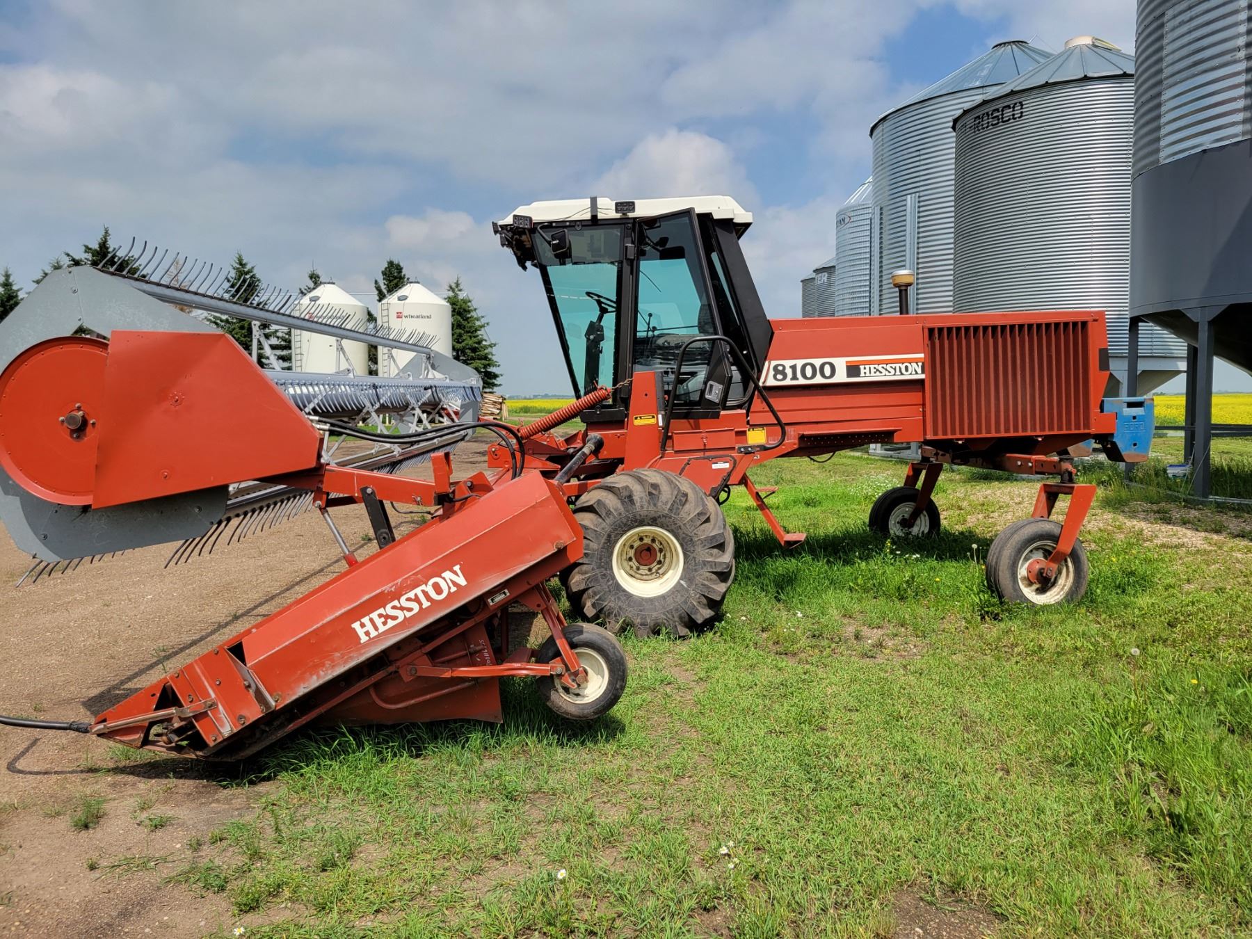 (GROUP LOT- 6,7,8 & 9) HESSTON 8100 Swather, 25', 2080 Hrs c/w UII ...