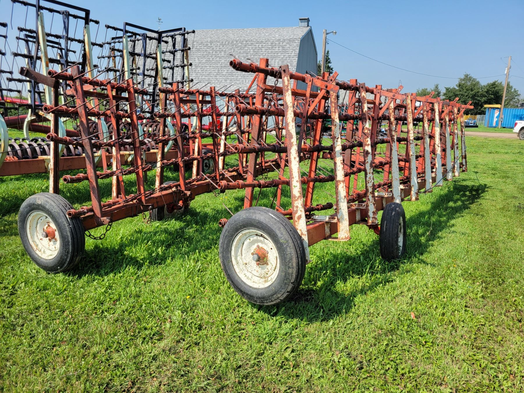 50' Flexicoil Tine harrows (Red), c/w drawbar, 5' harrows, tines are 10 ...