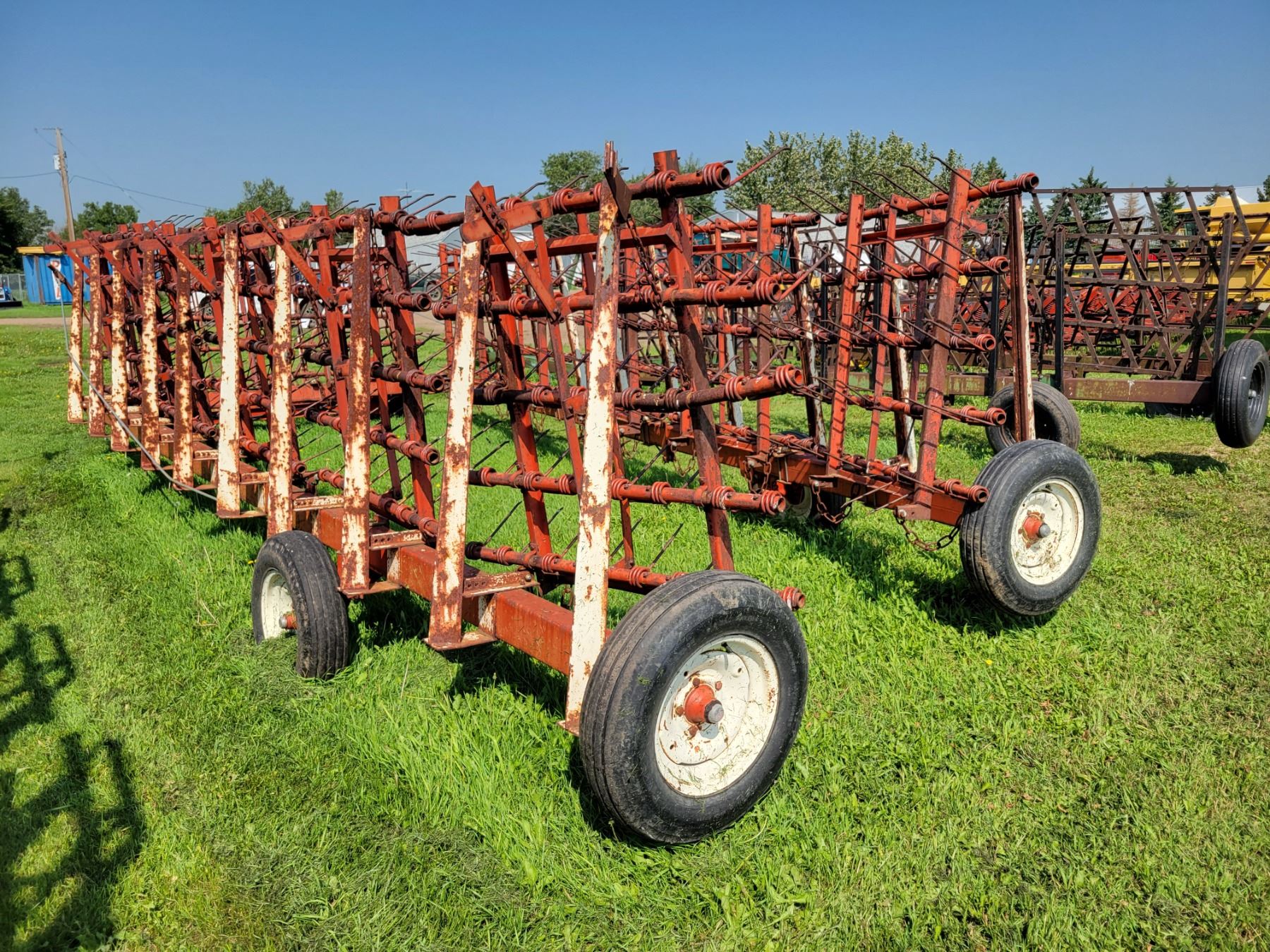 50' Flexicoil Tine harrows (Red), c/w drawbar, 5' harrows, tines are 10 ...