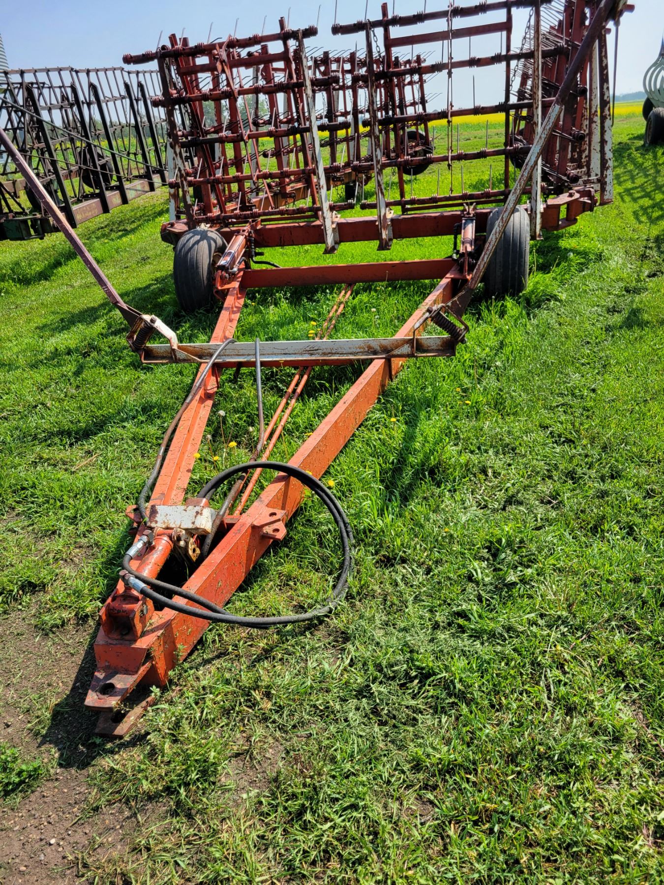 50' Flexicoil Tine harrows (Red), c/w drawbar, 5' harrows, tines are 10 ...
