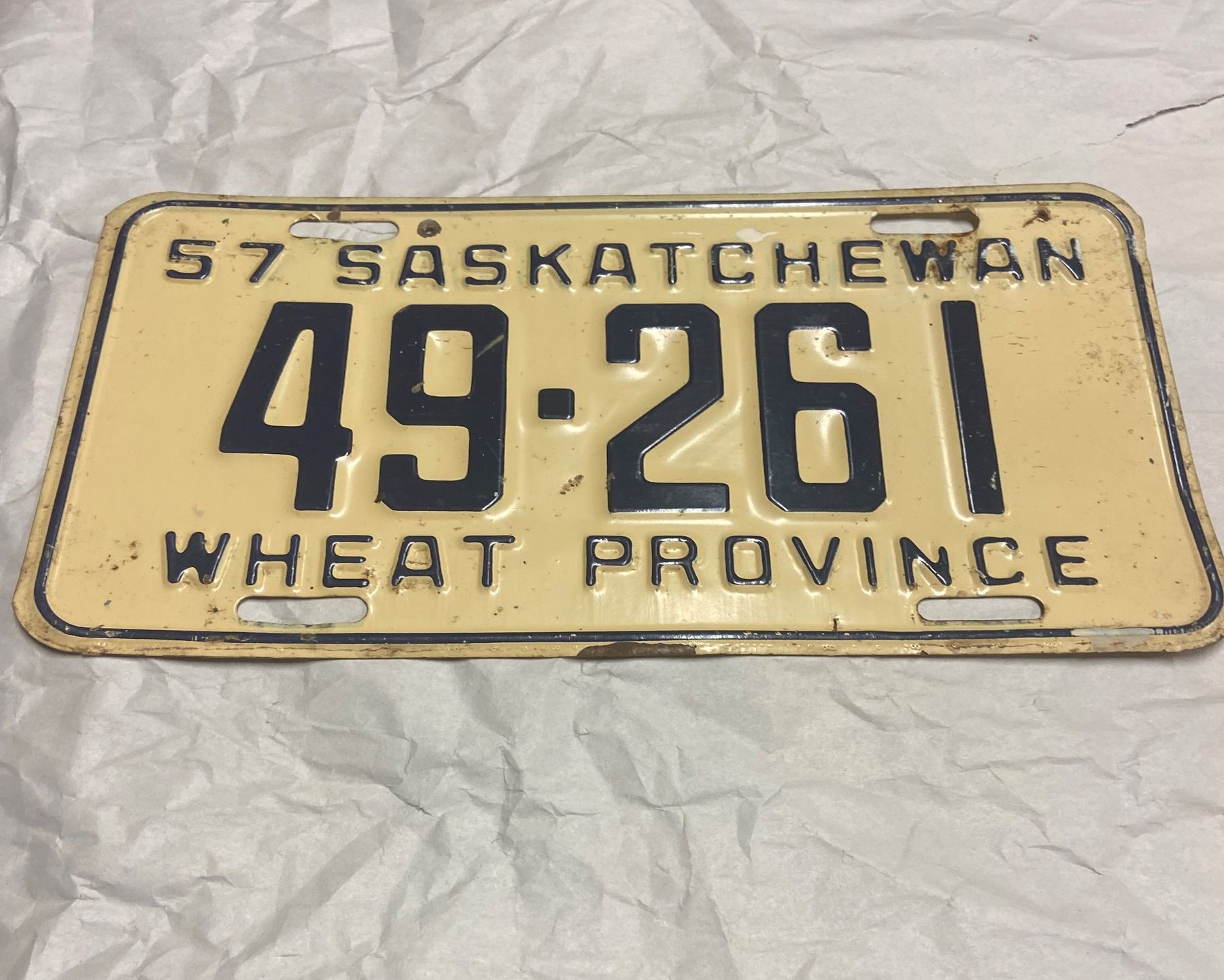 1957 Saskatchewan License plate - Schmalz Auctions