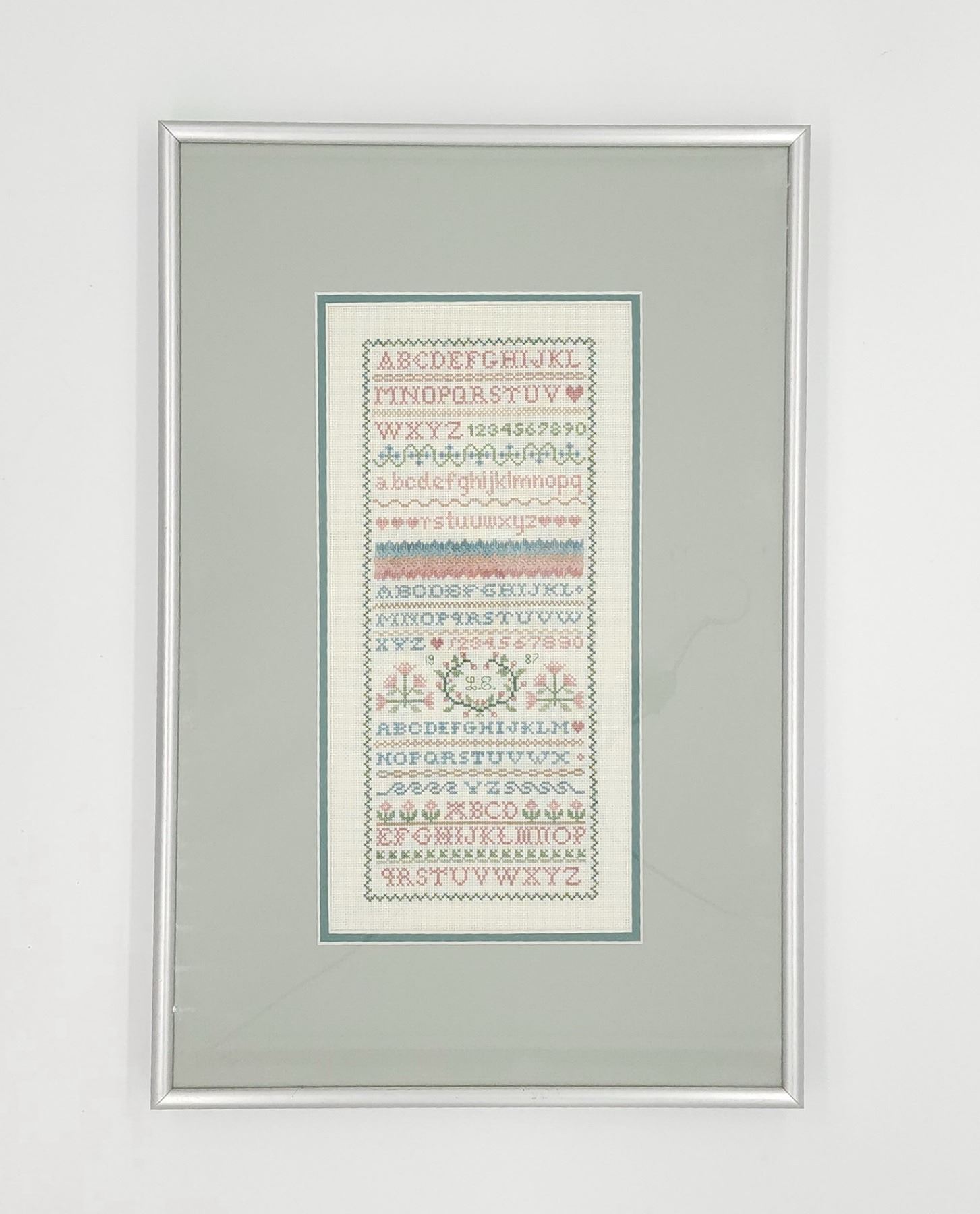 Vintage framed needlepoint sampler