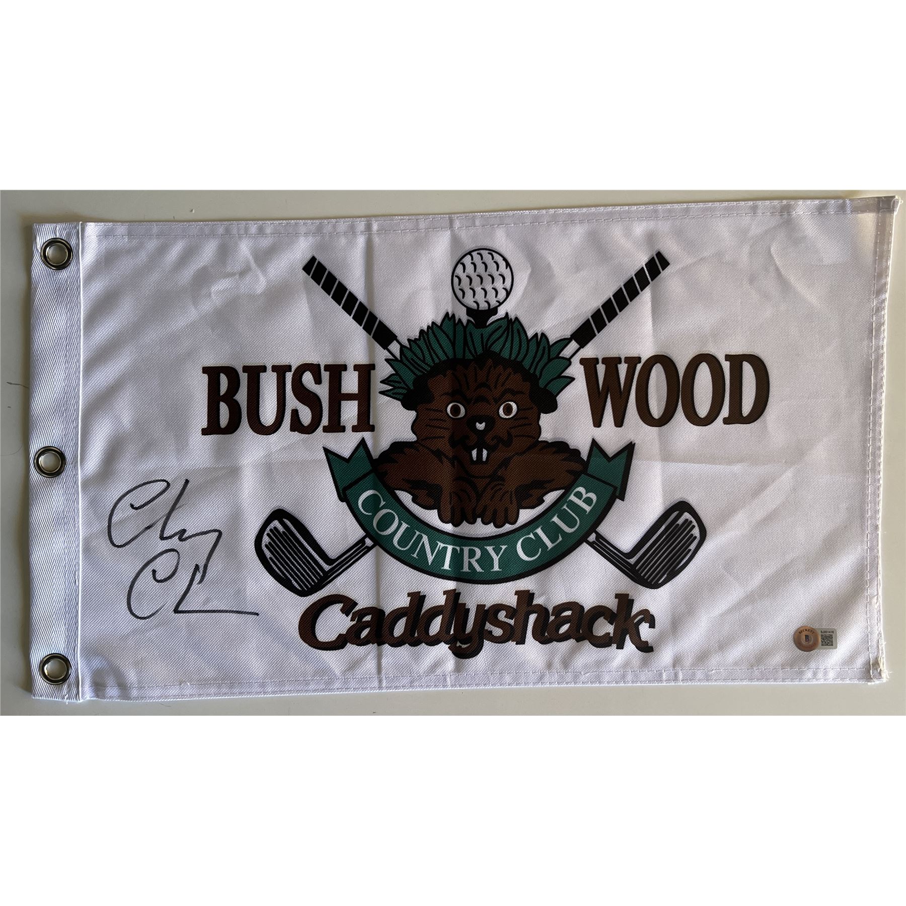 Caddyshack Chevy Chase signed pin flag. Beckett authenticated