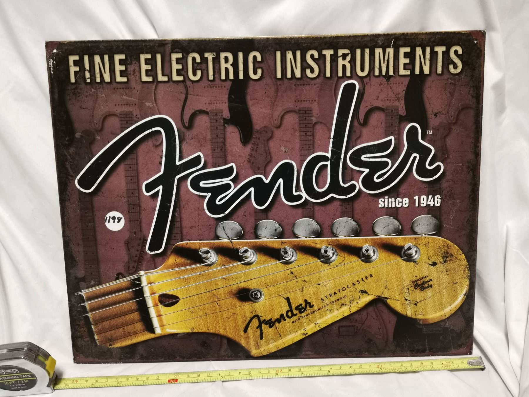 Fender guitar tin sign - Schmalz Auctions