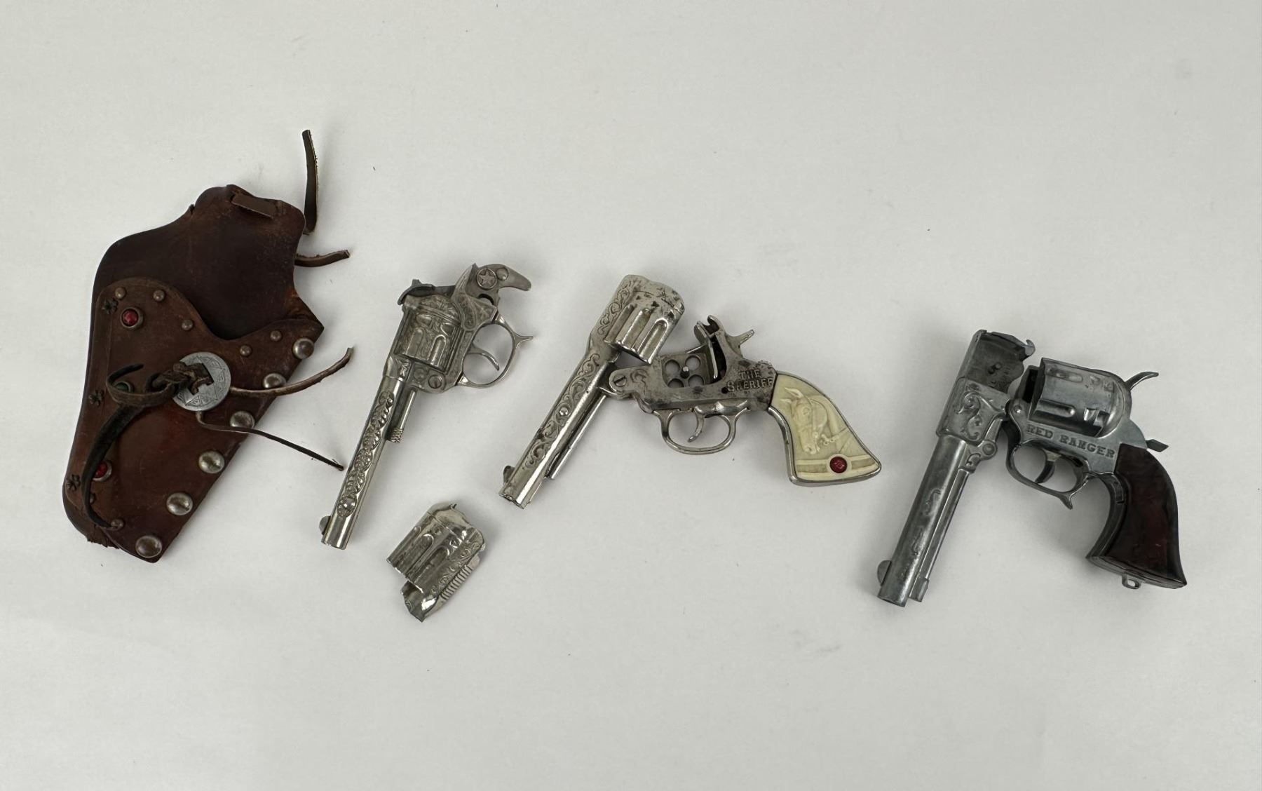 Collection of Cap Gun Parts