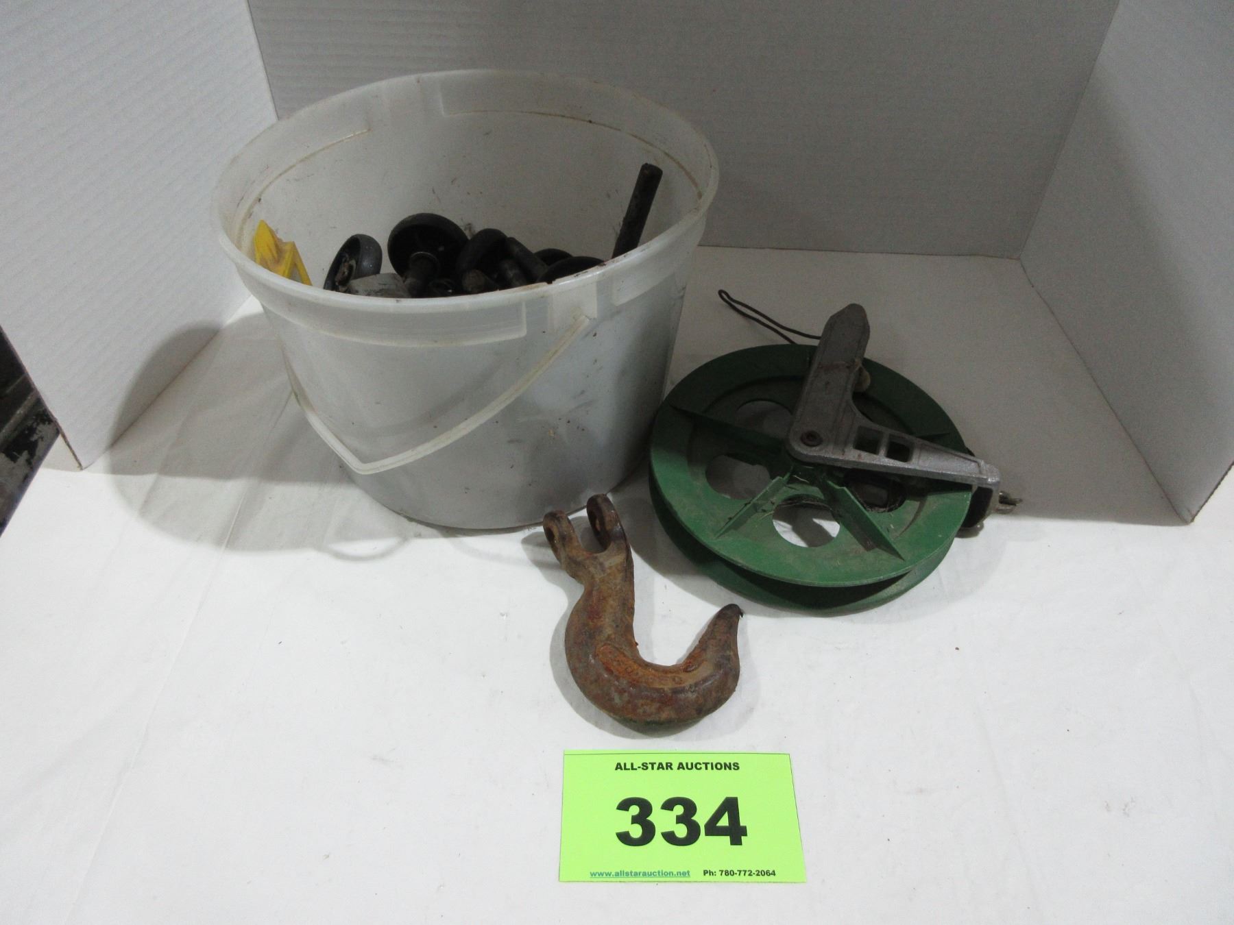 ESTATE: PAIL WITH CLOTHES LINE PULLEY, HOOK, ROLLERS, ETC