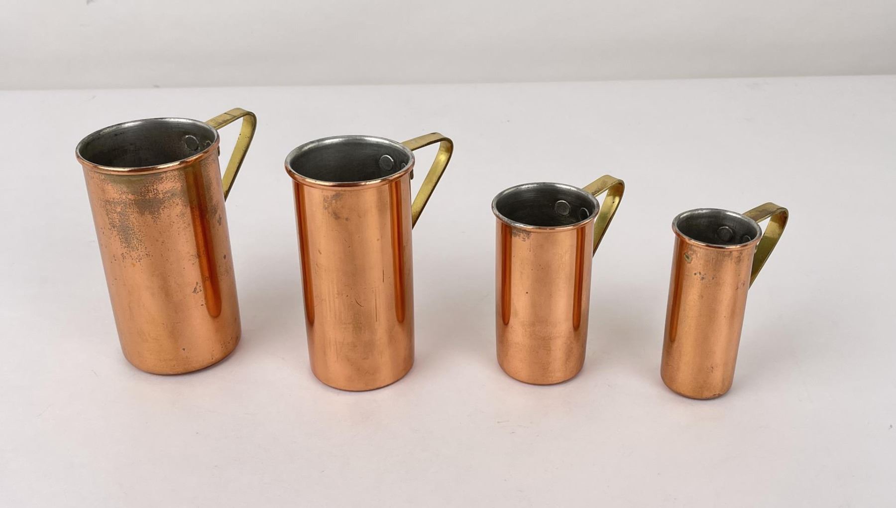 Collection of Graduated Copper Measuring Cups