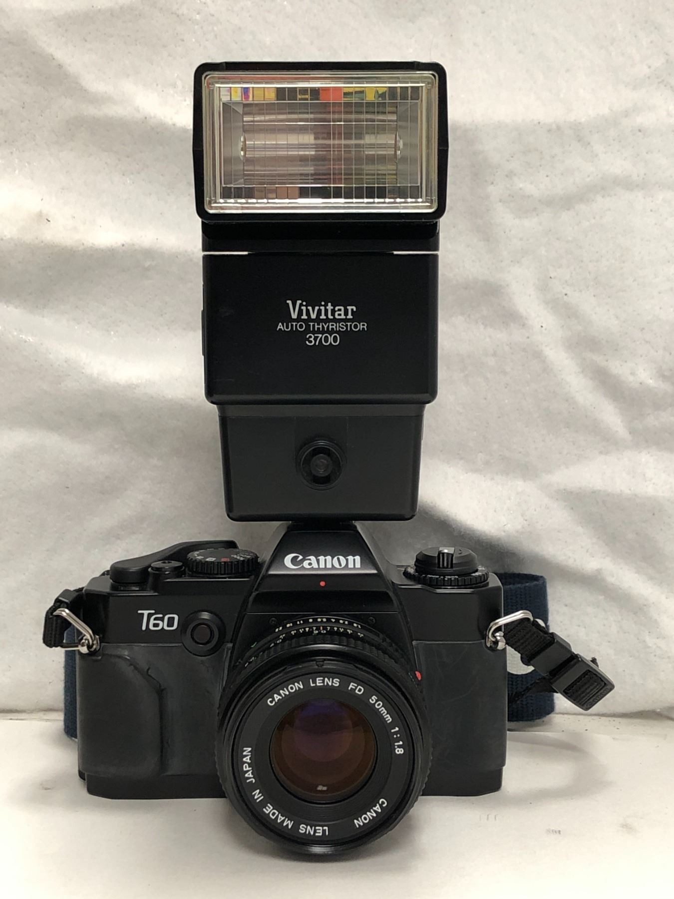 Canon T60 camera w/ 50mm lens & Vivitar Auto Thyristor 3700 flash