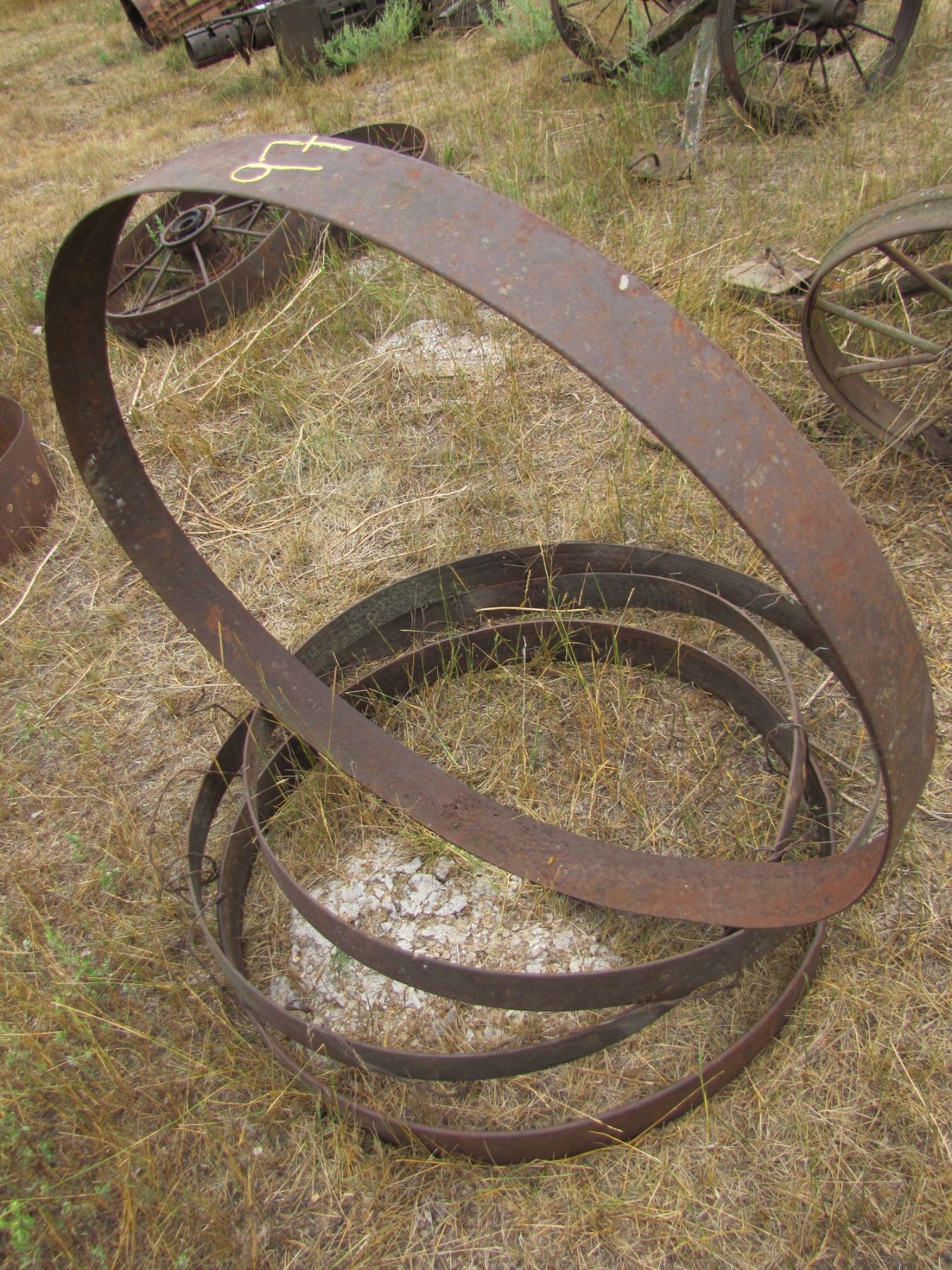 Lot of four wagon wheel steel rims