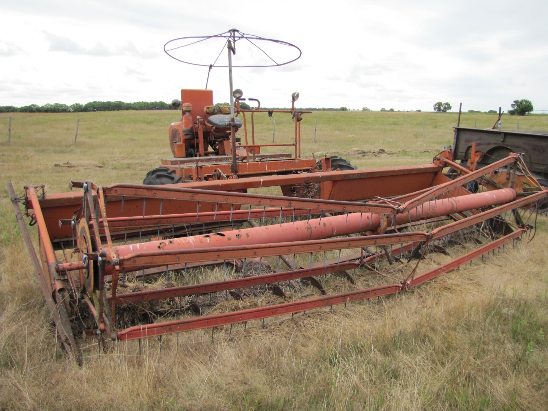Coop implements 17 foot self-propelled swather with Wisconsin engine
