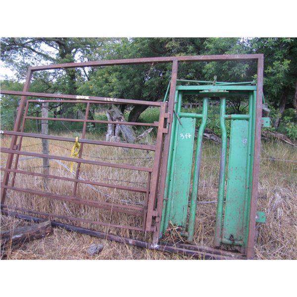 Head gate with corral panel attached