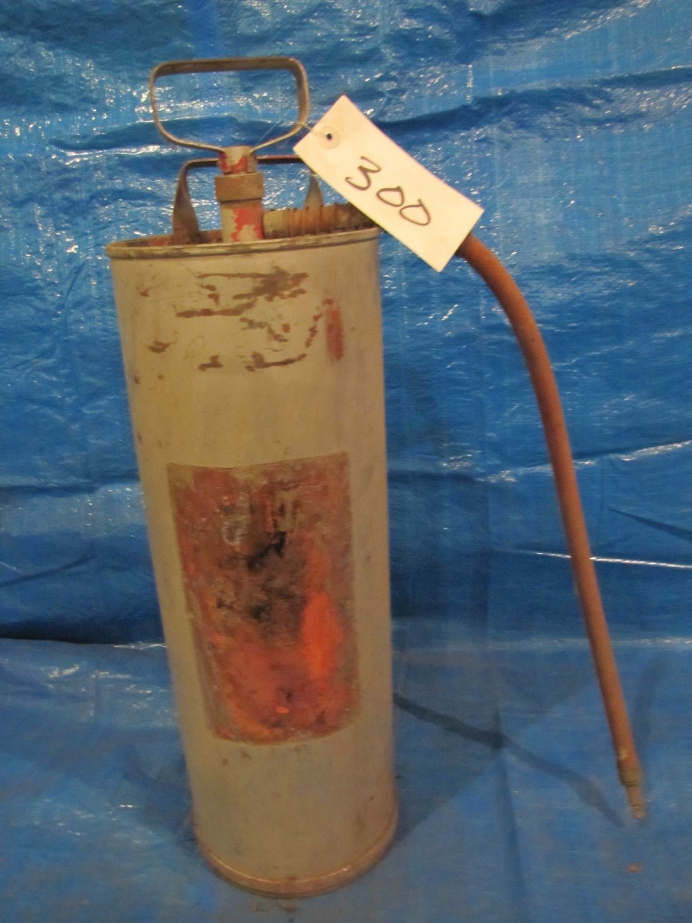 Brass hand pump water fire extinguisher