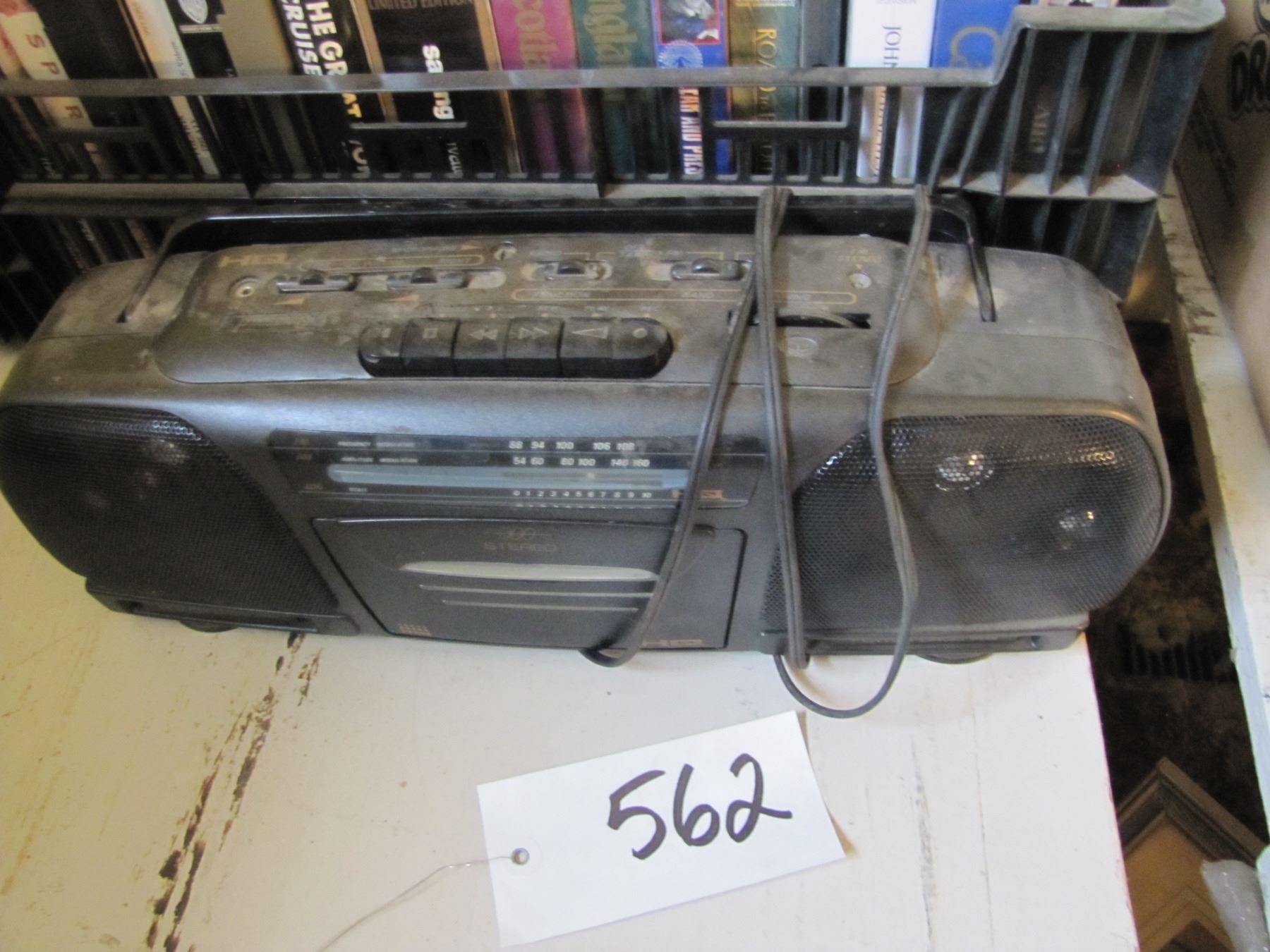 Lot of VHS tapes , radio , Sony VHS tape player , radio and cd player ...