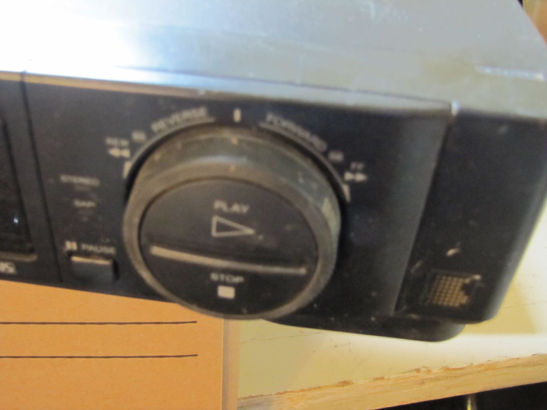 Lot of VHS tapes , radio , Sony VHS tape player , radio and cd player ...