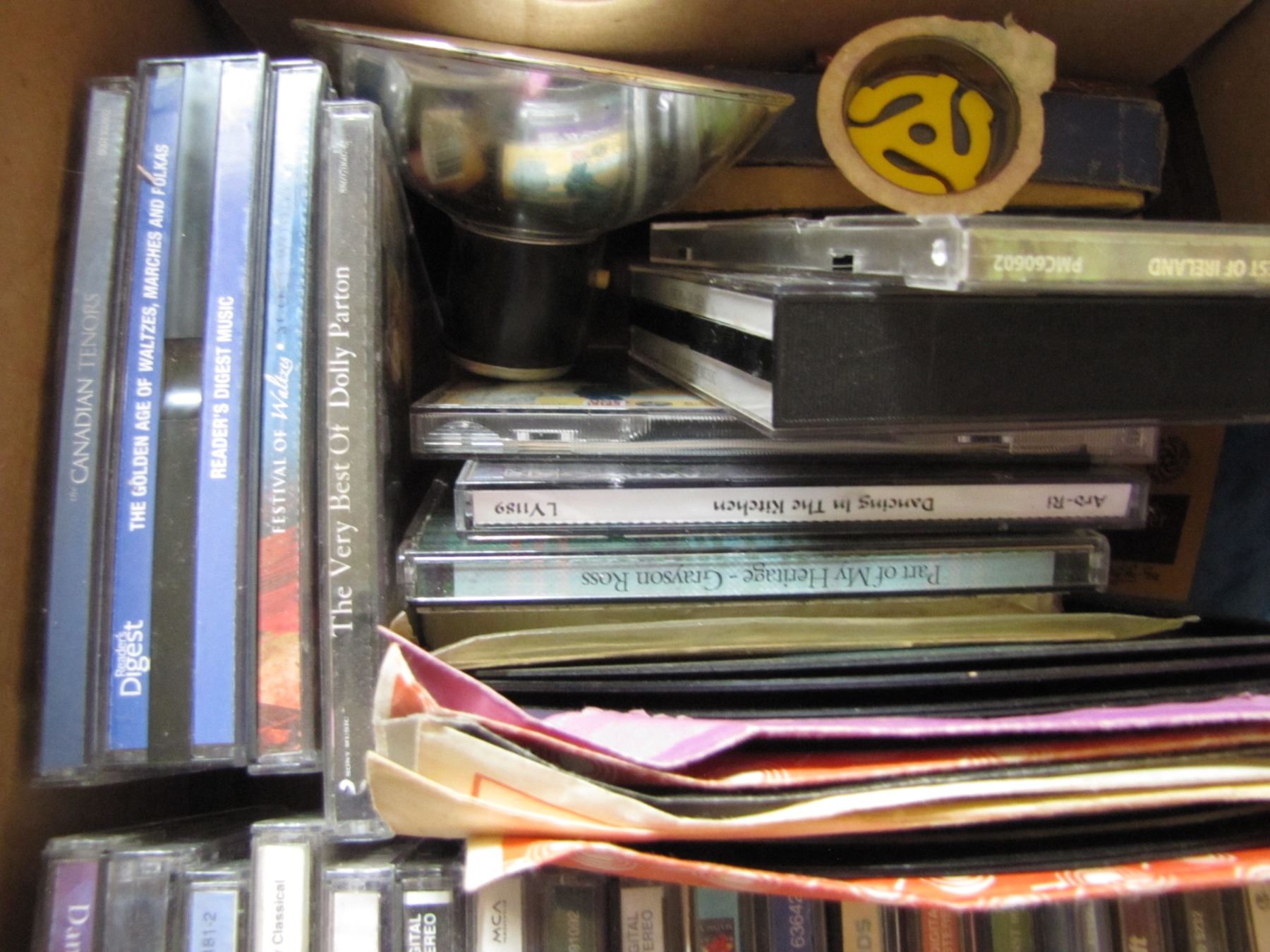 Lot of VHS tapes , radio , Sony VHS tape player , radio and cd player ...